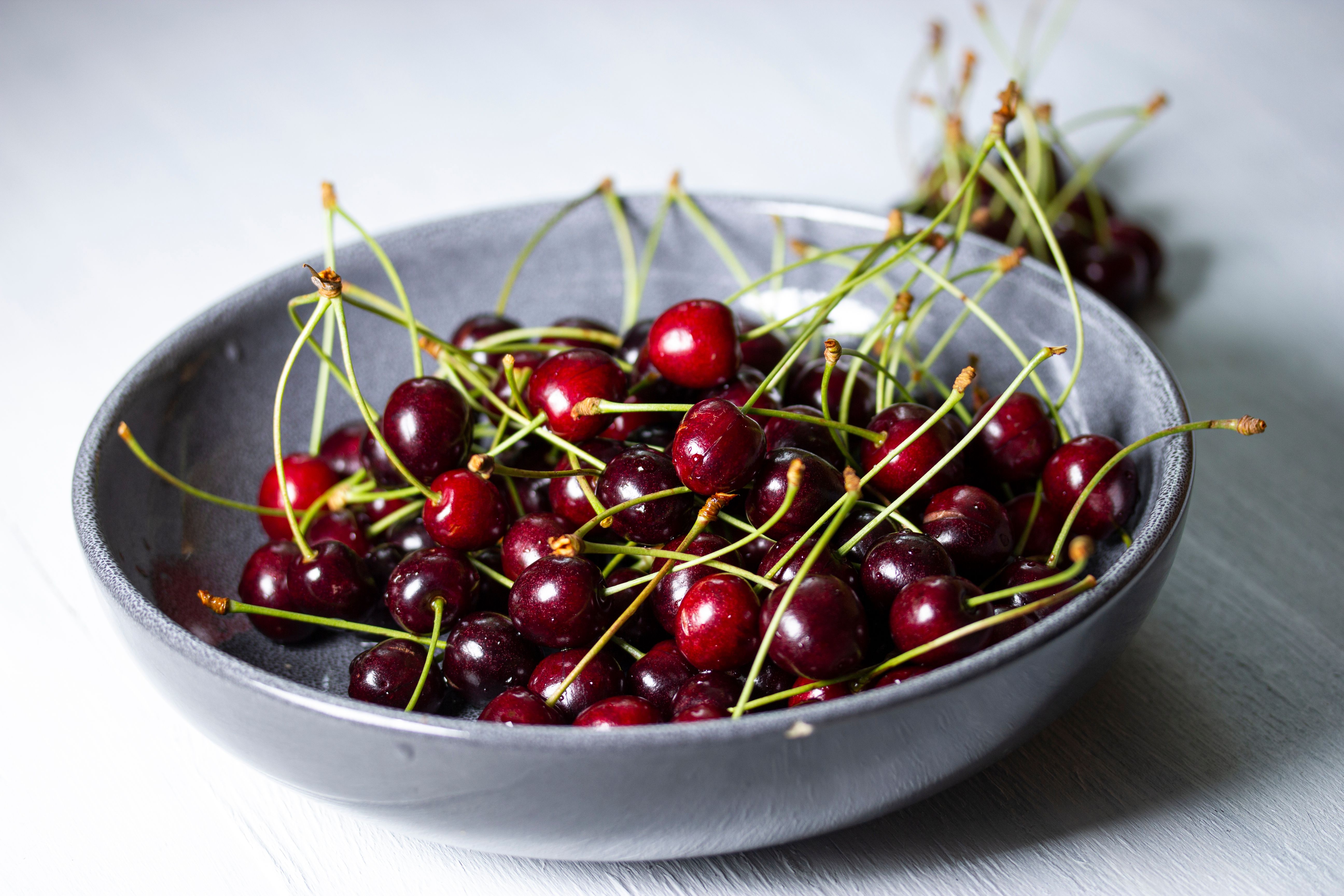 Close-Up Photo of Cherries in Bowl · Free Stock Photo