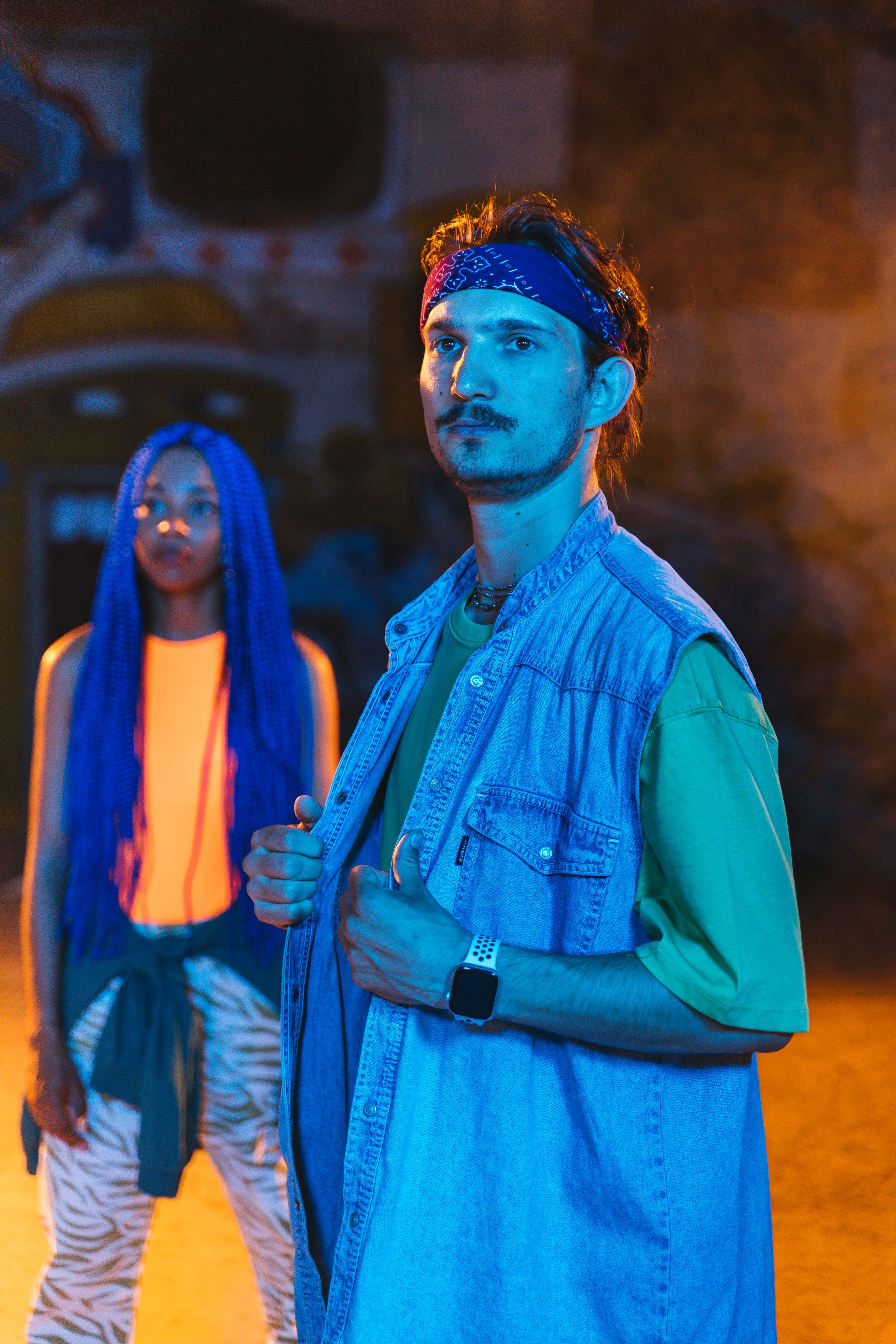 Man and Woman Illuminated by a Blue Light · Free Stock Photo