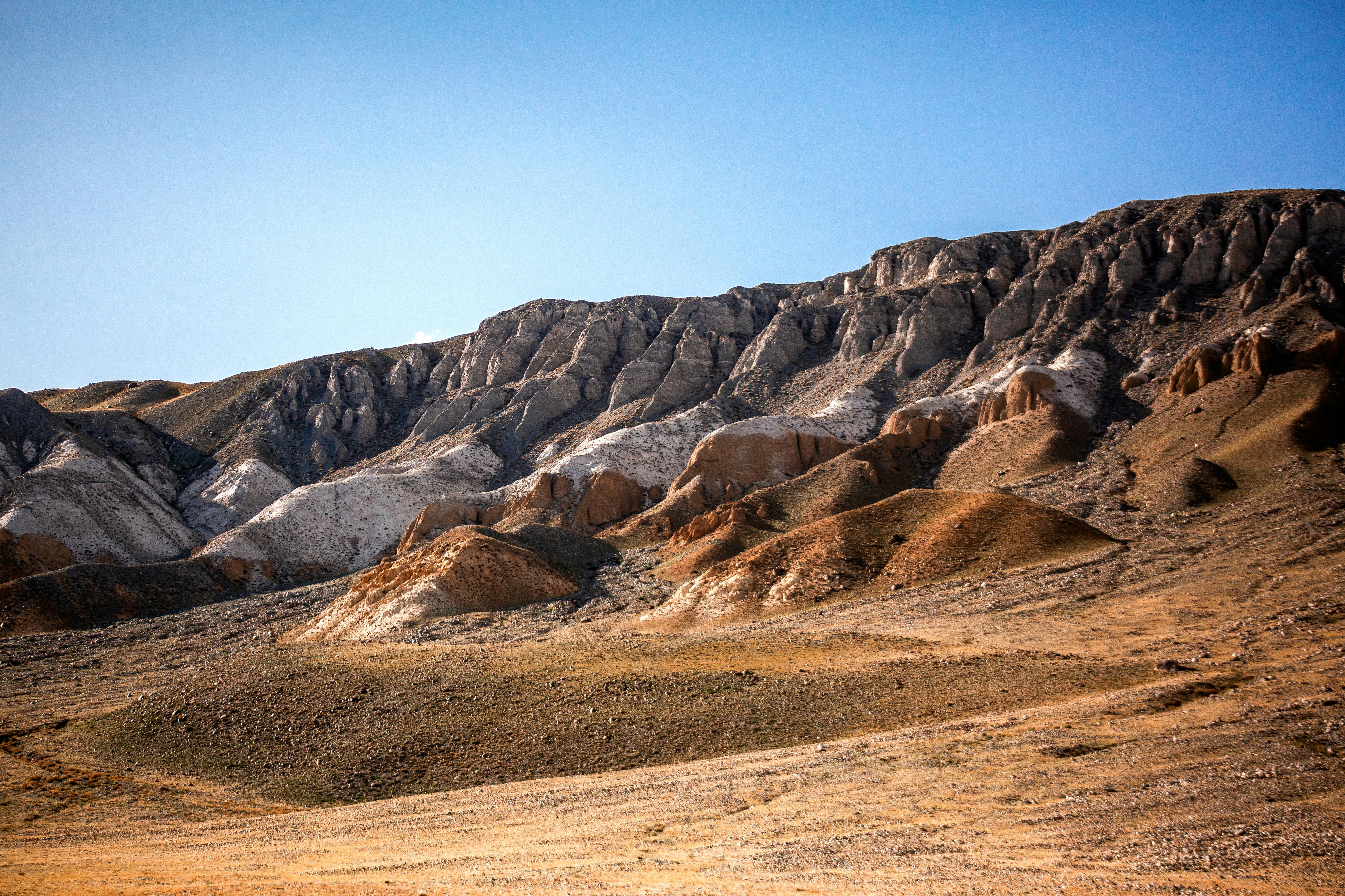 Gray Rocky Mountain Under the Blue Sky · Free Stock Photo