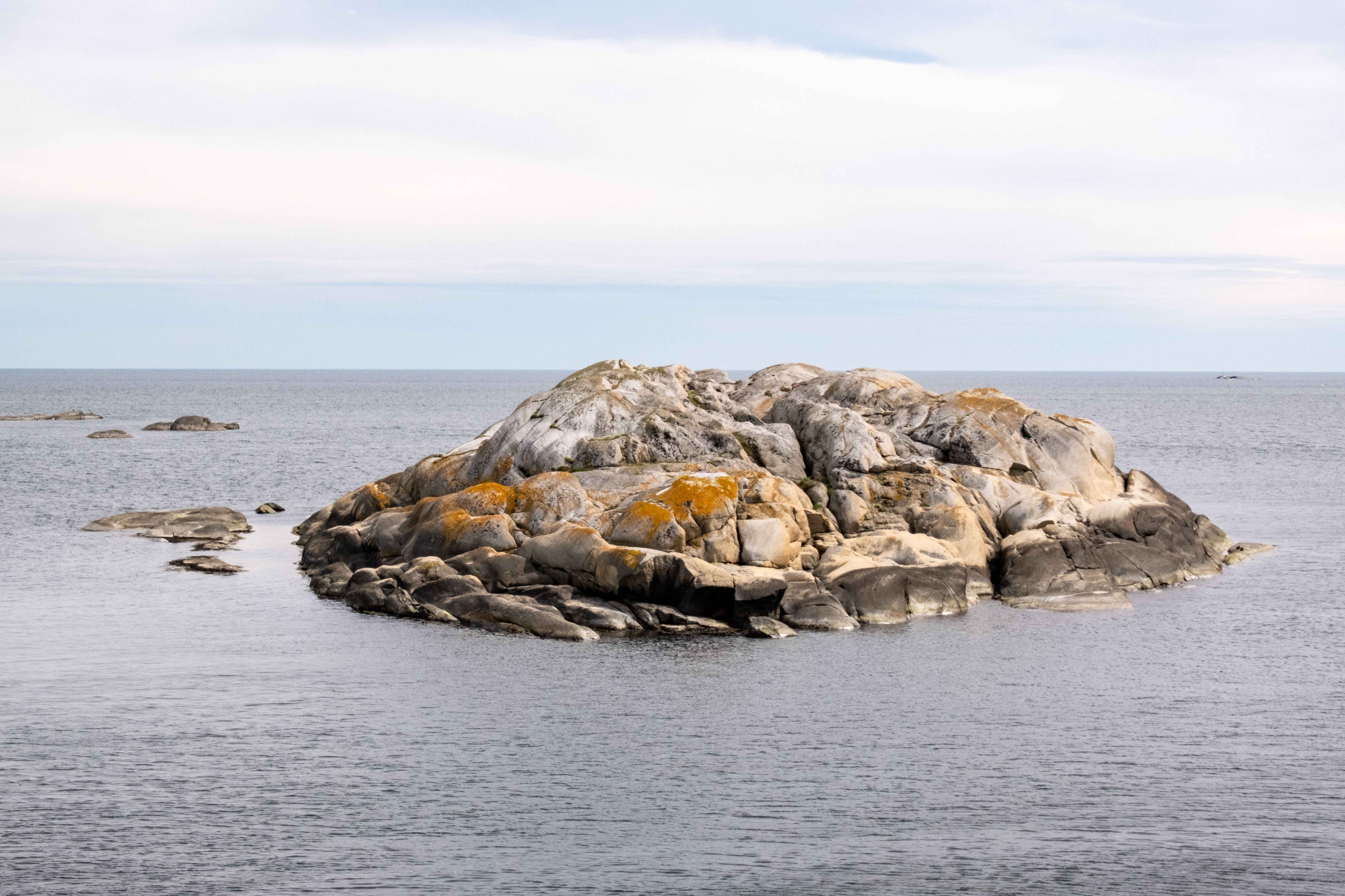 Drone Shot of a Geological Formation at Sea · Free Stock Photo