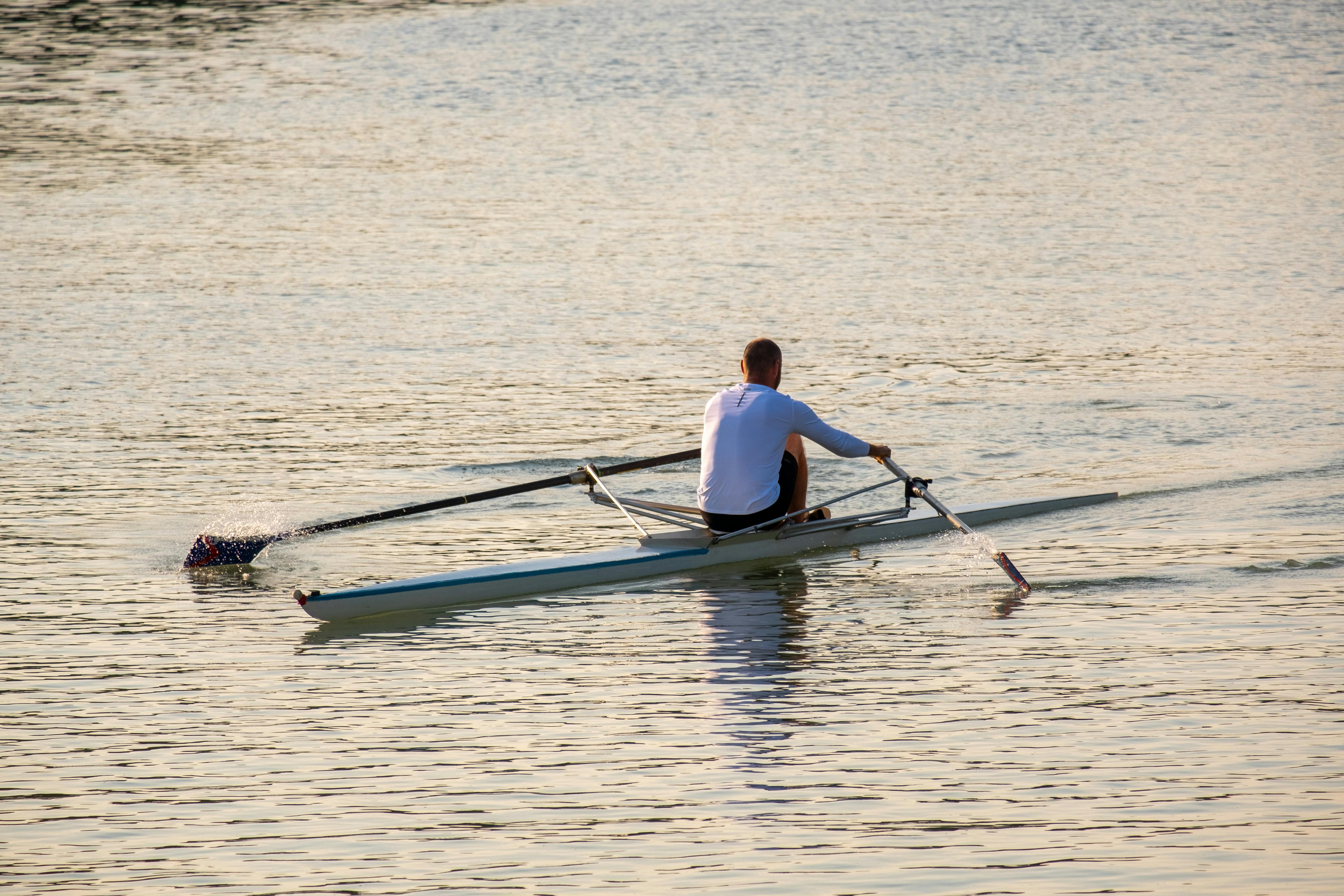 A Man Rowing a Boat · Free Stock Photo