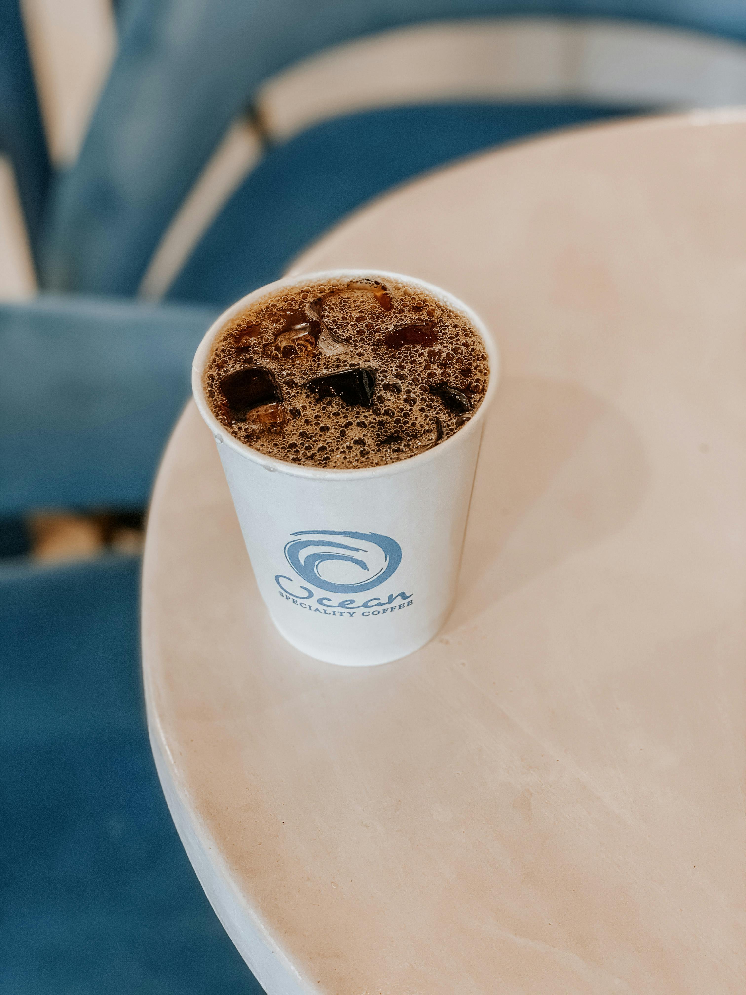 A Beverage on a Paper Cup · Free Stock Photo