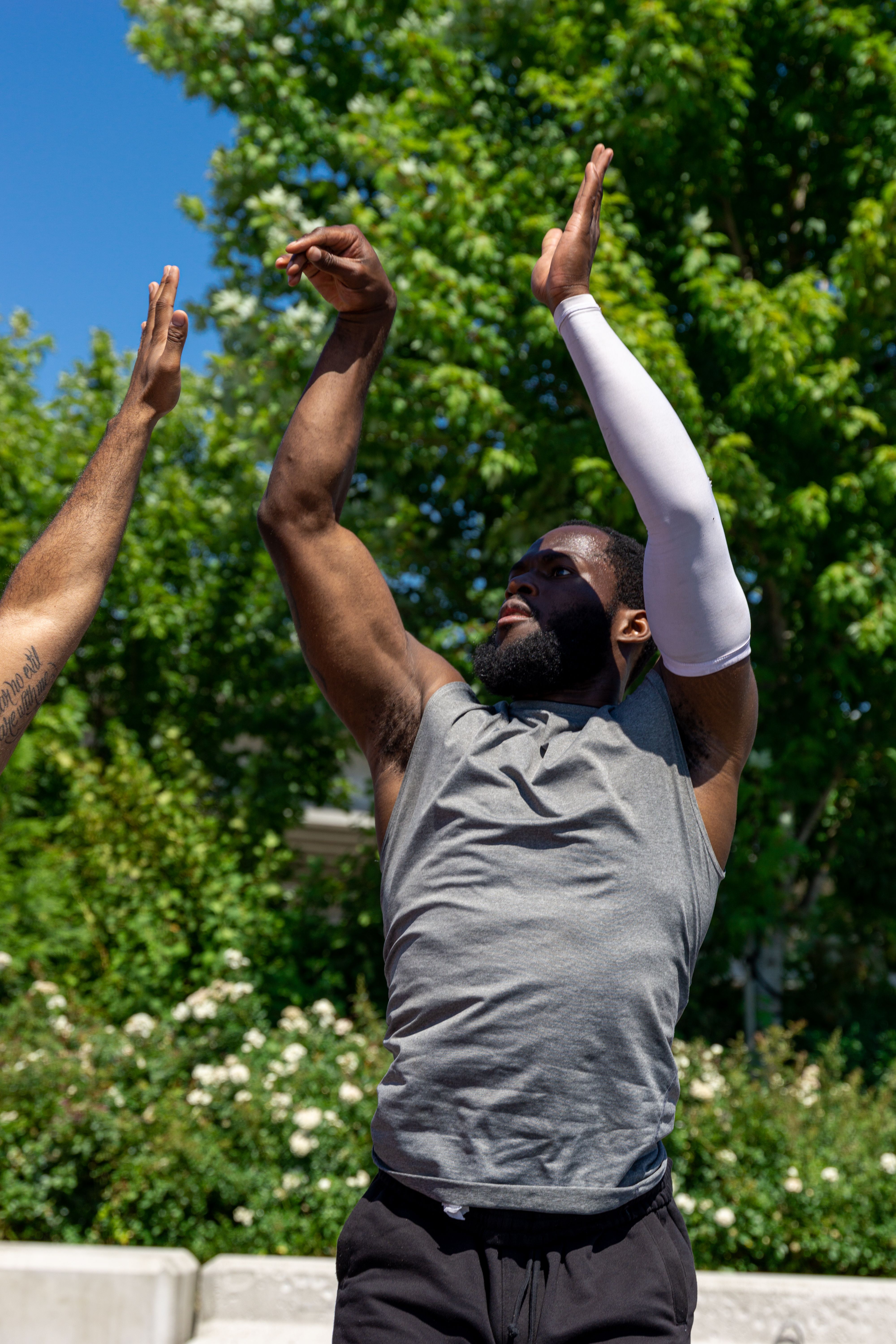 Man in Activewear Doing a Jump Shot · Free Stock Photo