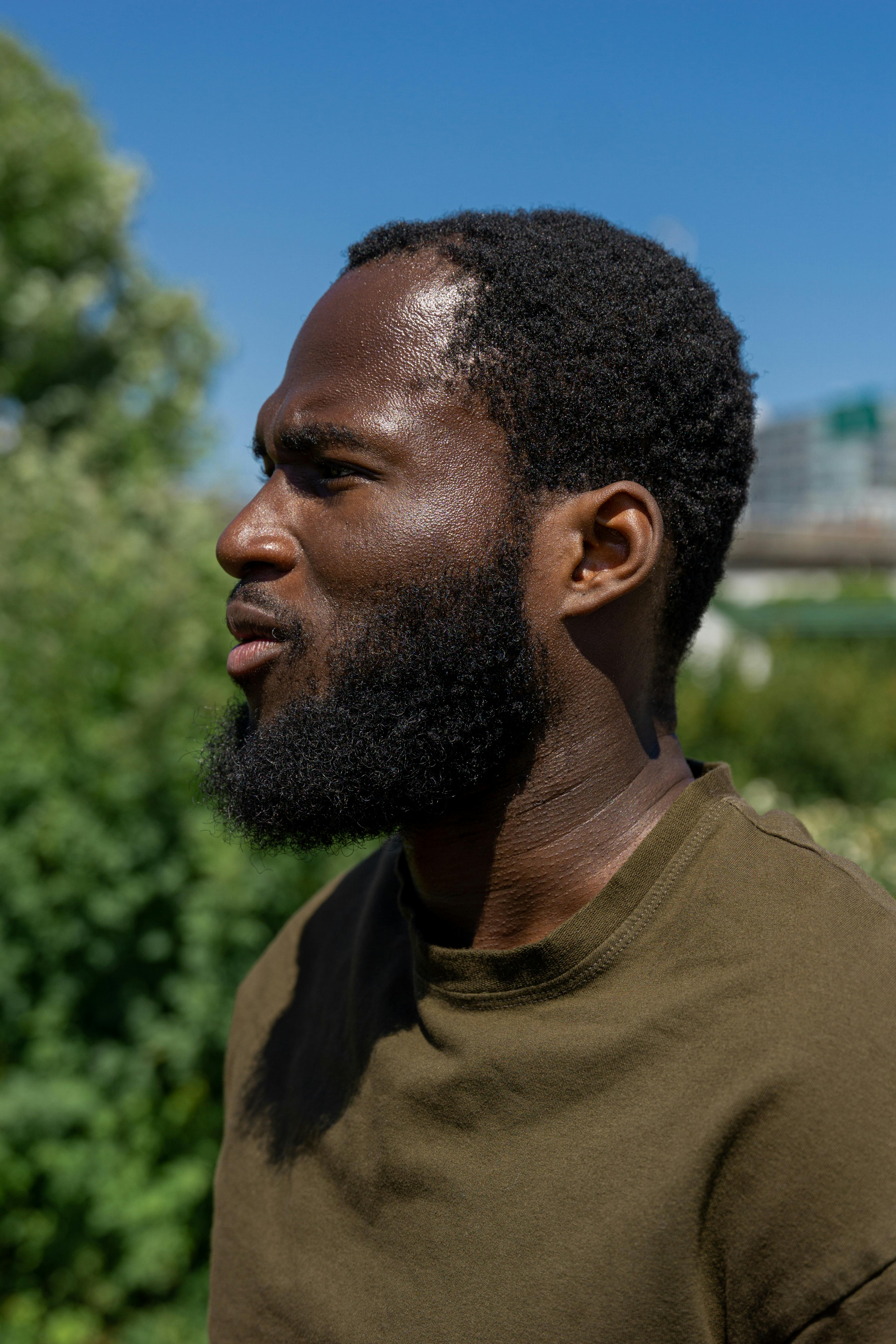 Side Profile of a Serious Man · Free Stock Photo