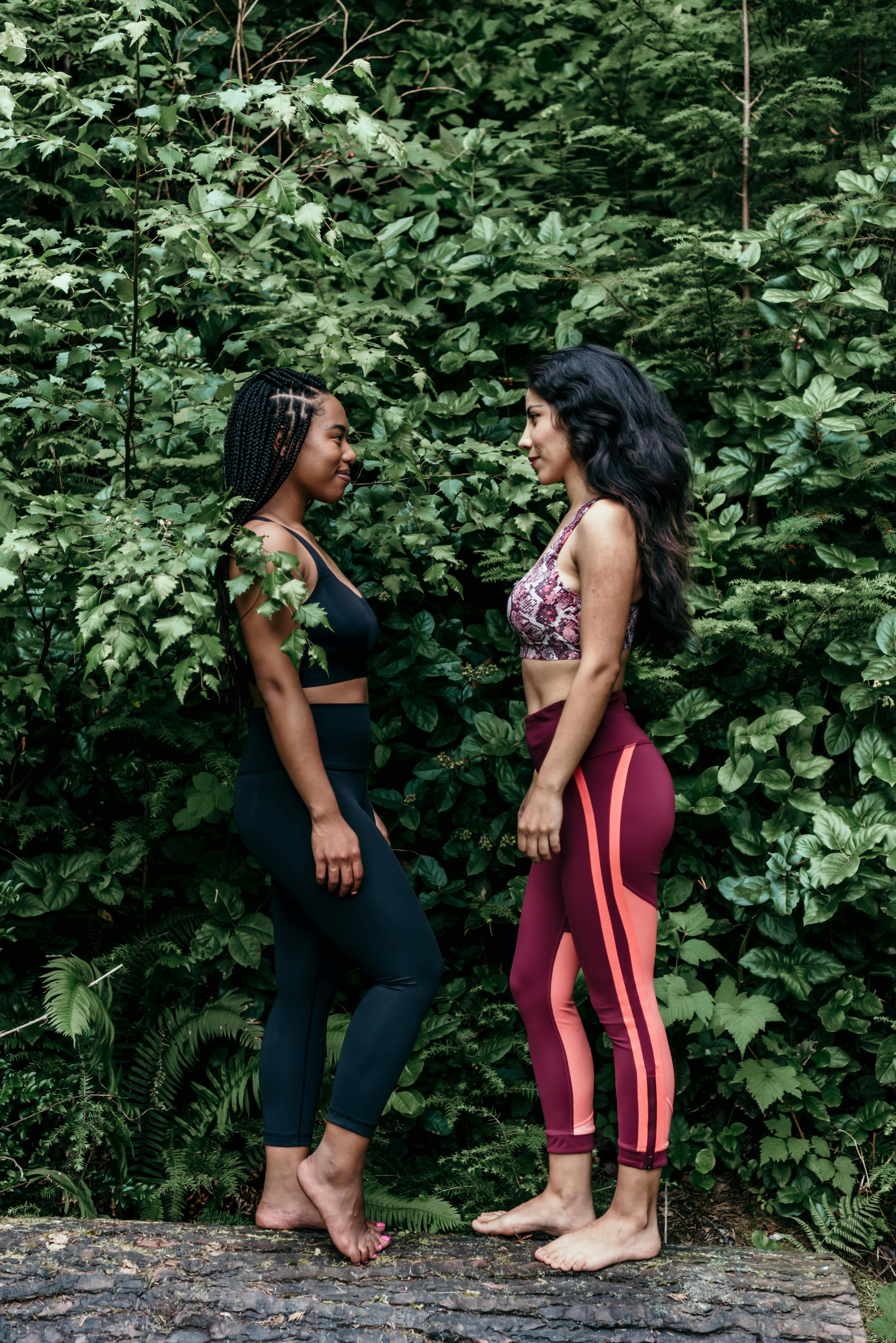 Women Standing back to Back · Free Stock Photo