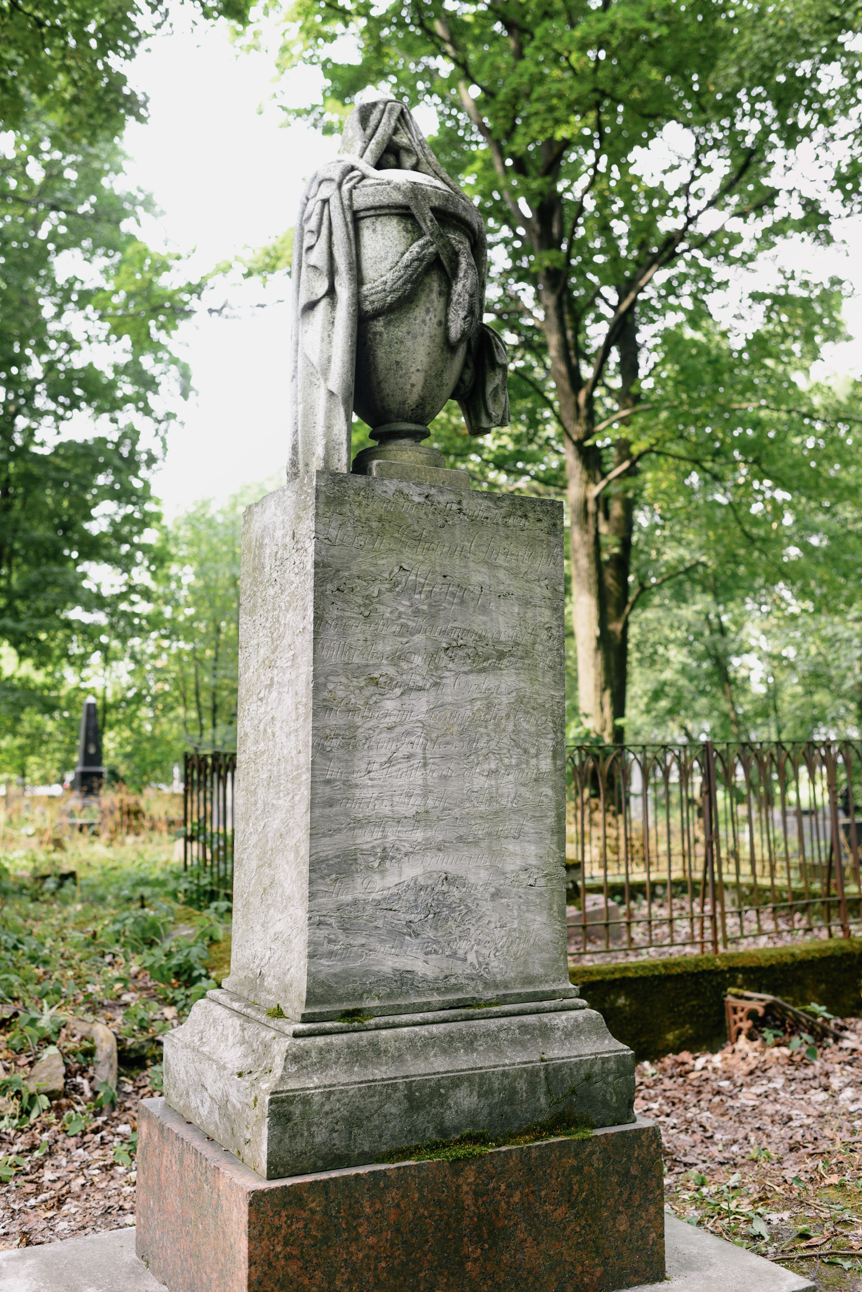 Detail of Gravestone with Draped Stone Urn · Free Stock Photo