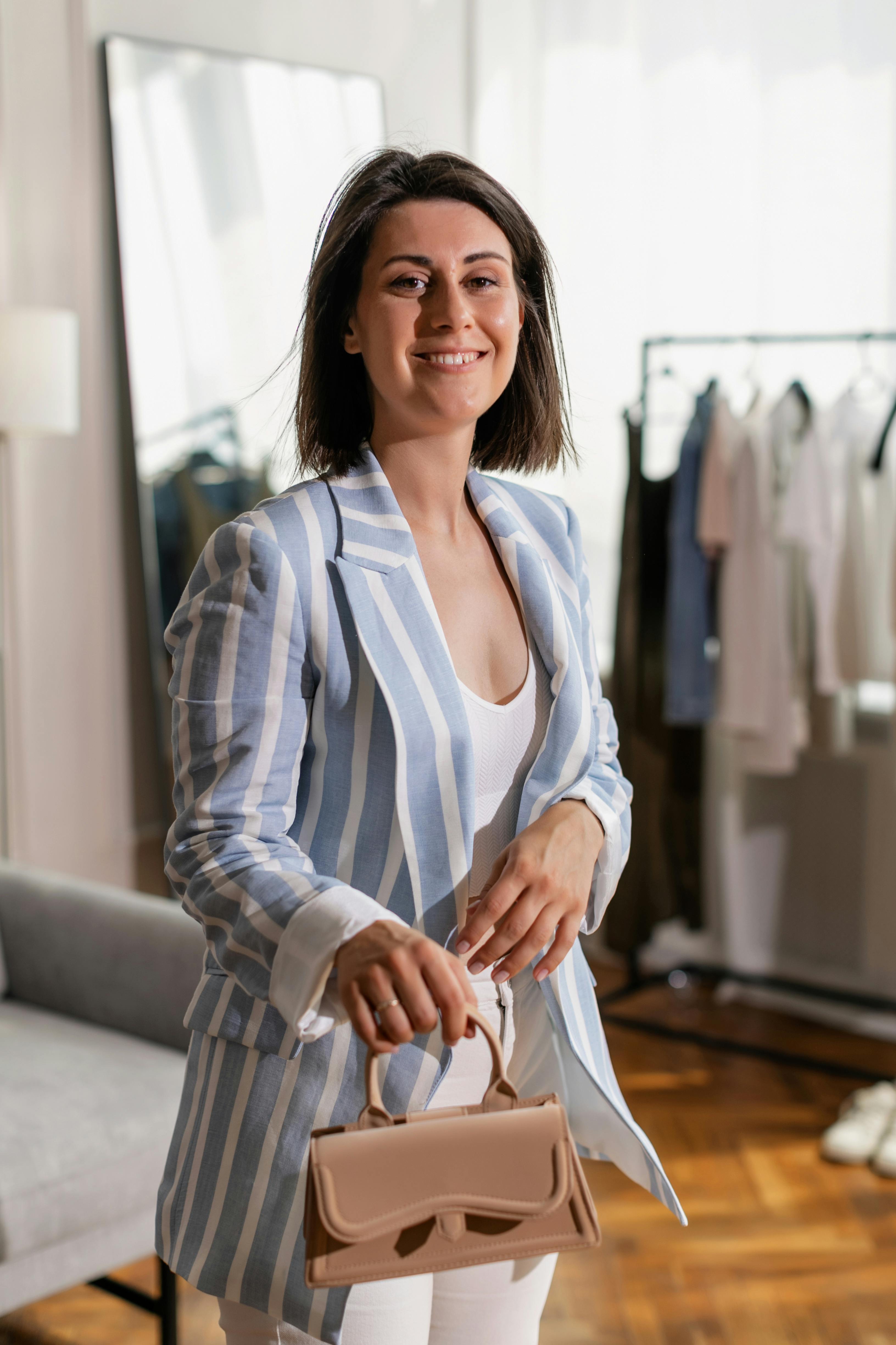 A Woman Wearing A Striped Blazer · Free Stock Photo