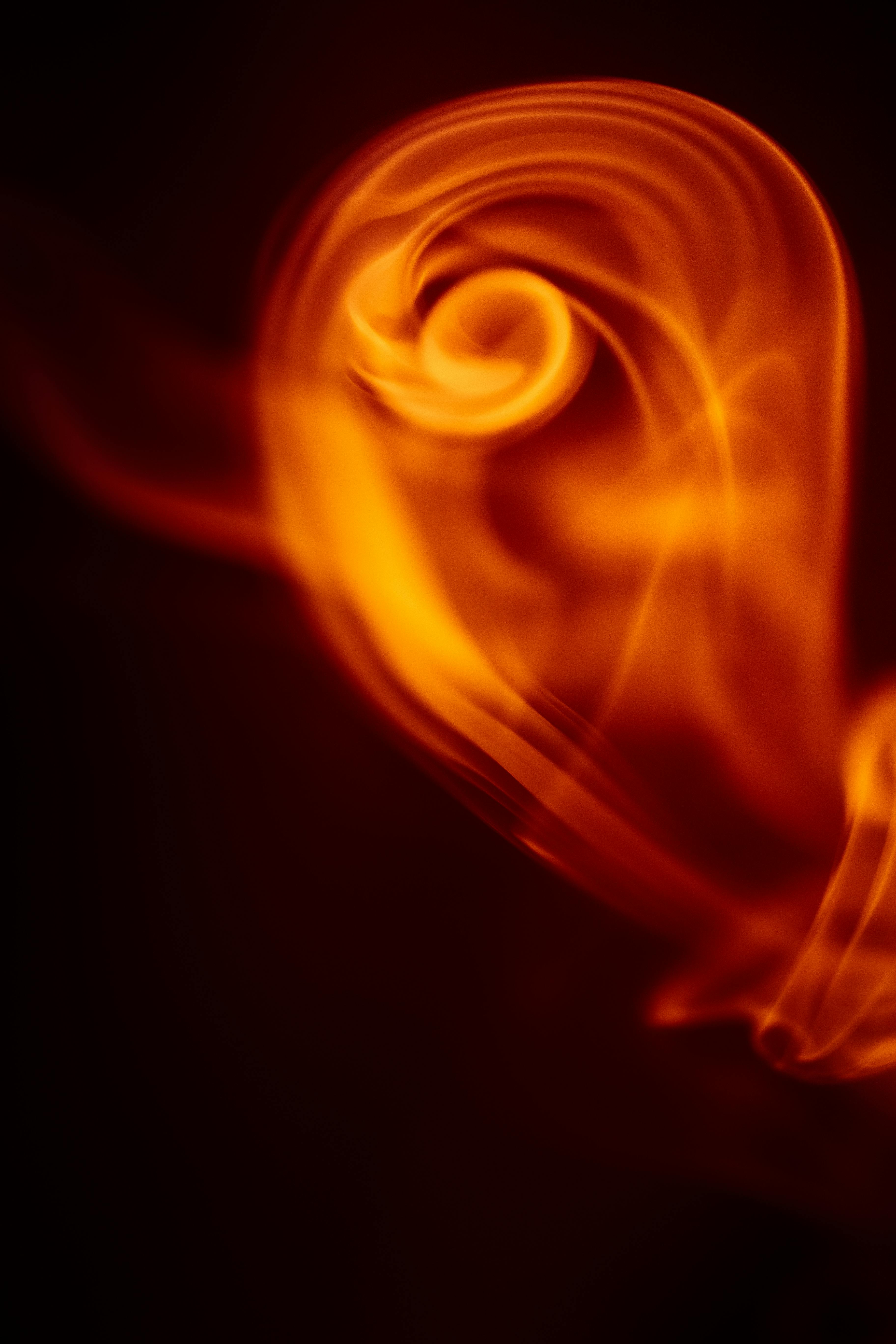Orange Smoke on Black Background · Free Stock Photo