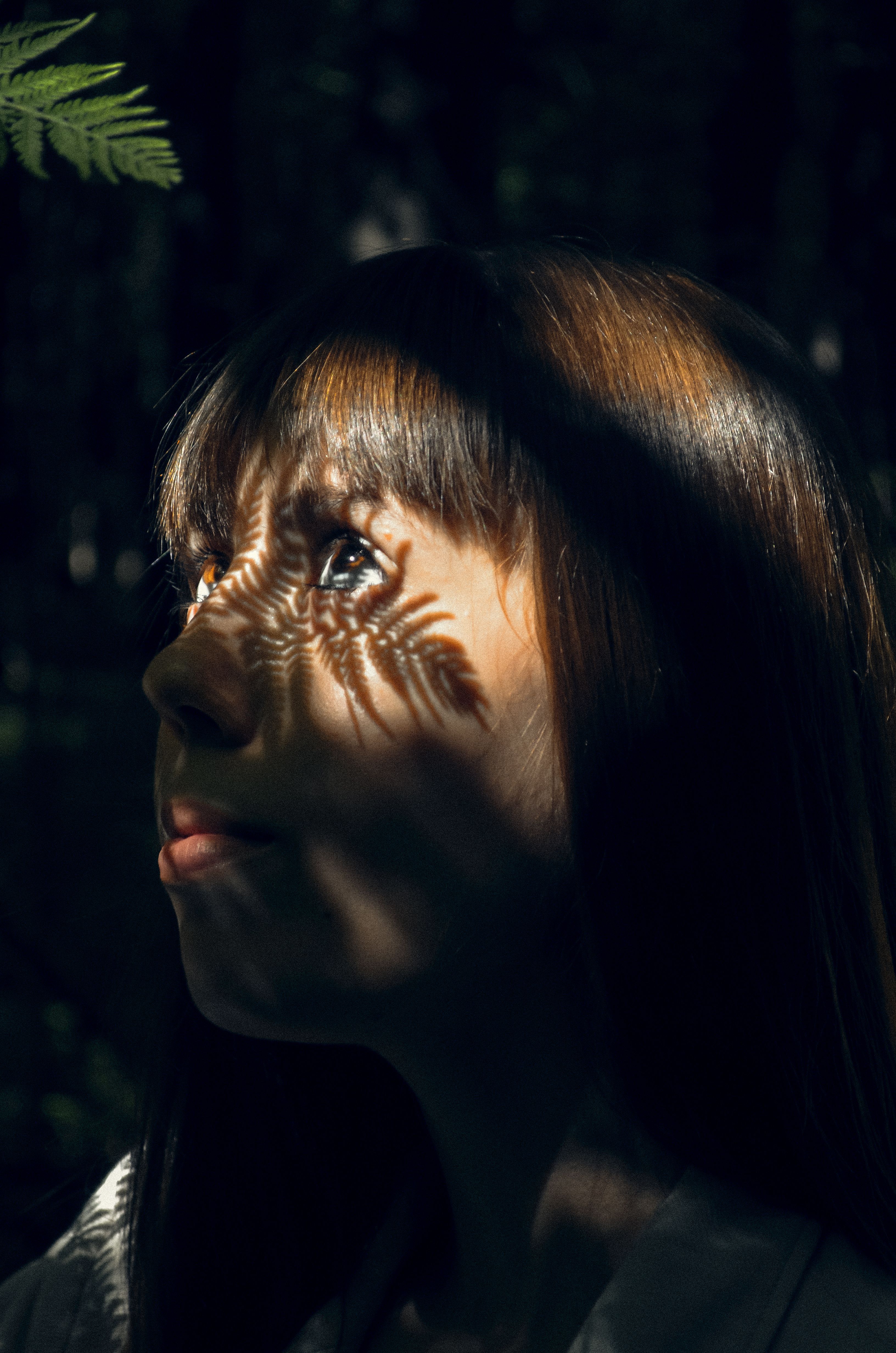 Girl Posing in Light Shadow · Free Stock Photo