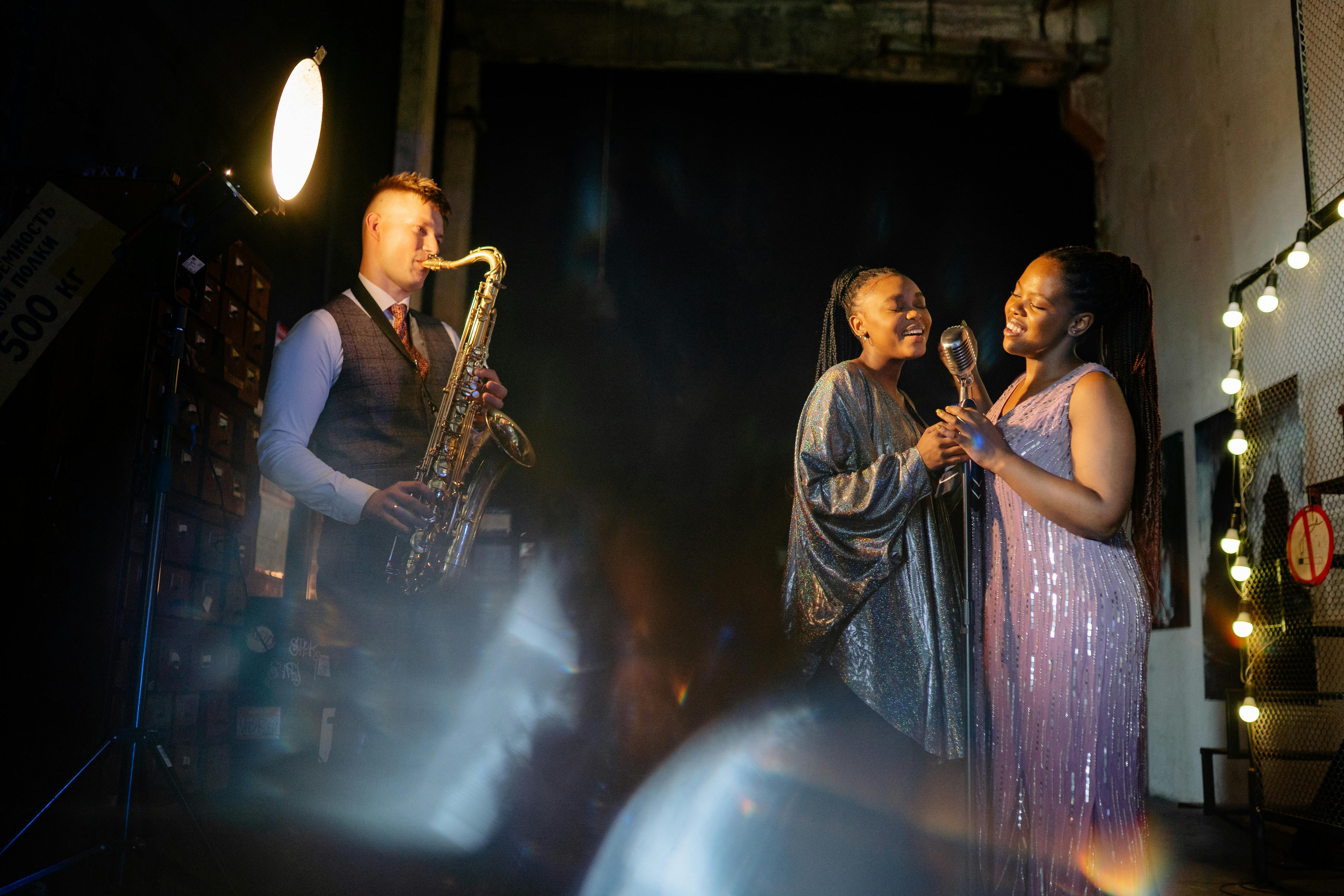A Group of Musicians in a Live Performance · Free Stock Photo