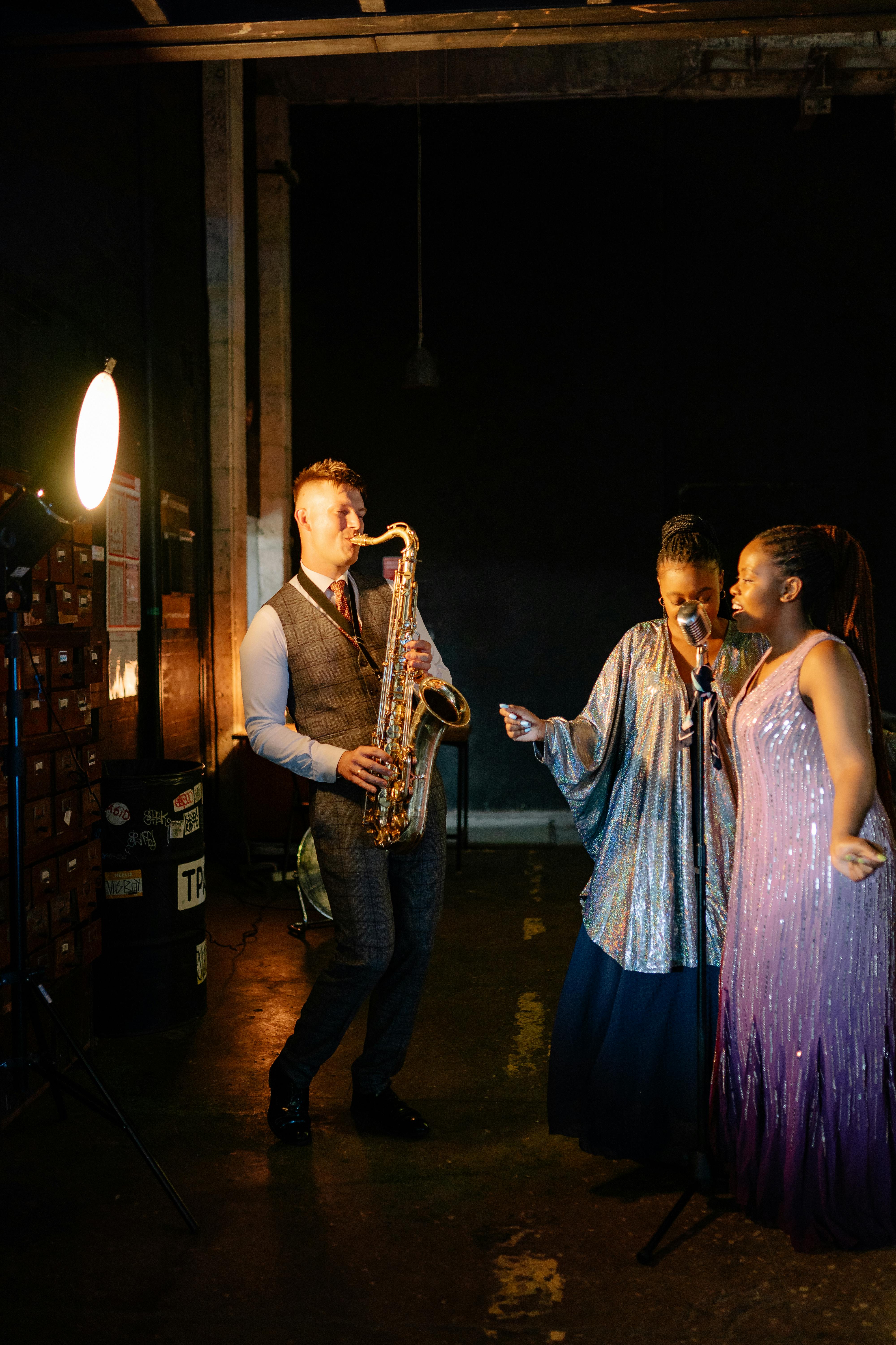 A Group of Musicians in a Performance · Free Stock Photo