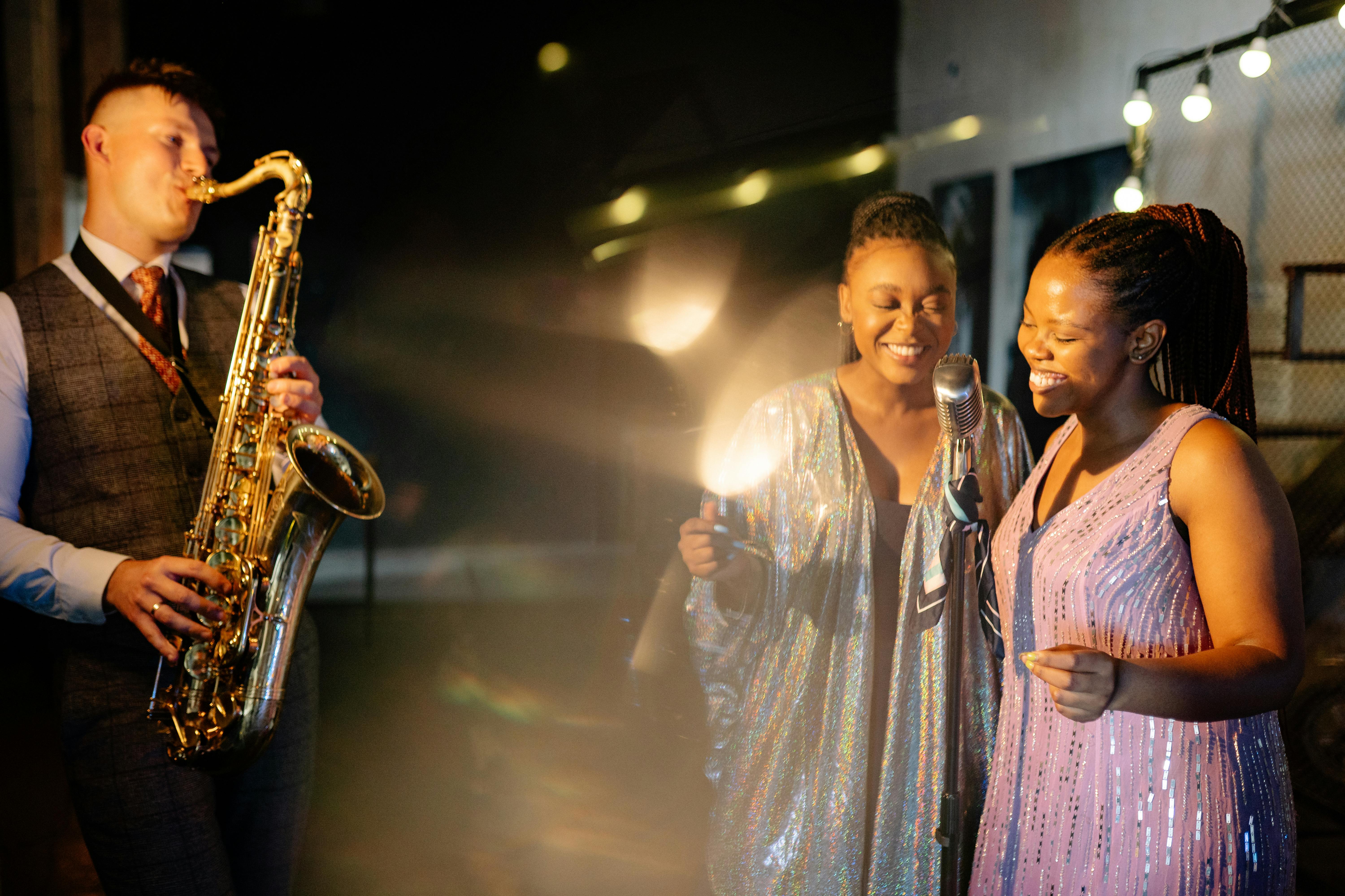 Band Having Fun Performing a Concert · Free Stock Photo