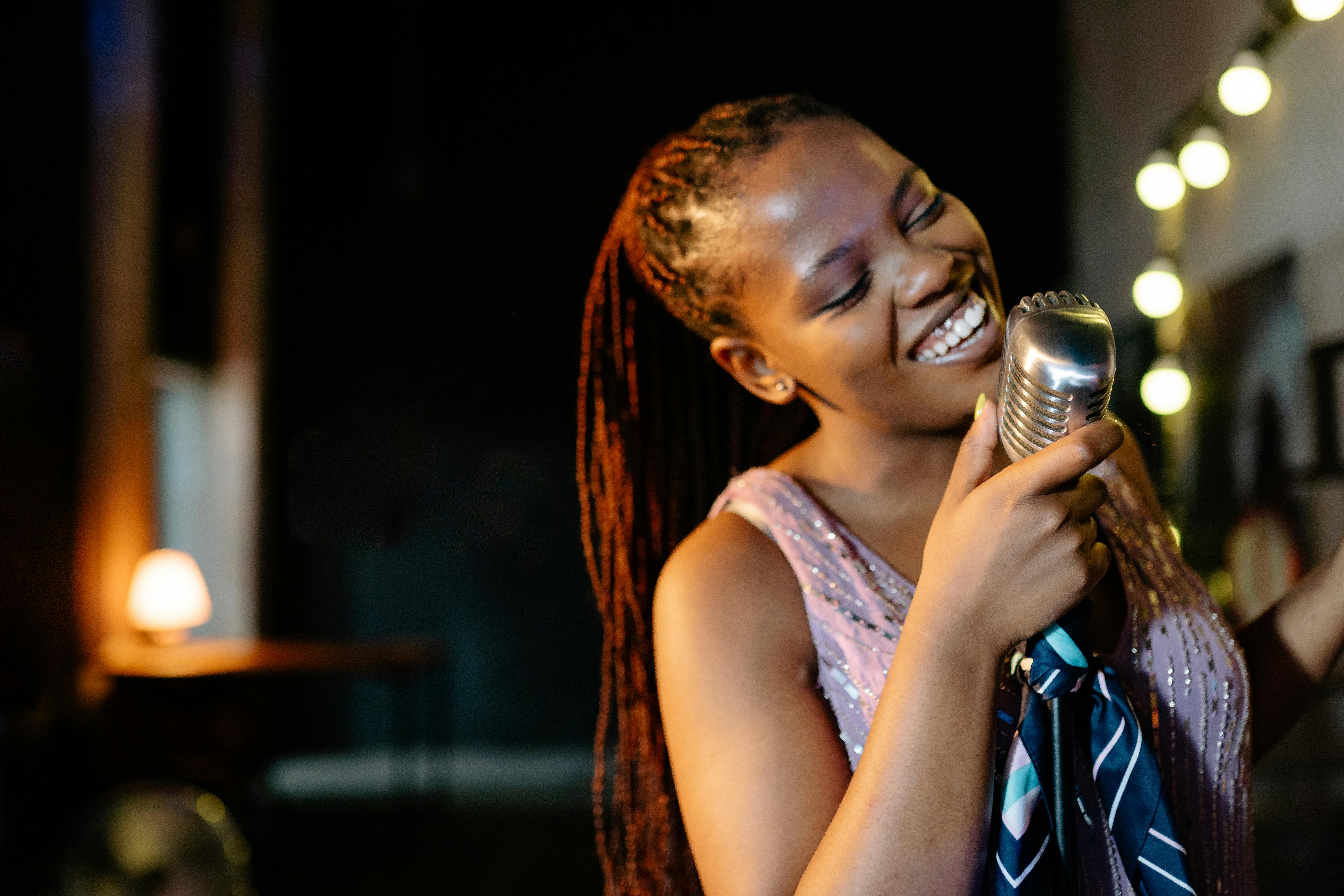 A Woman Singing · Free Stock Photo