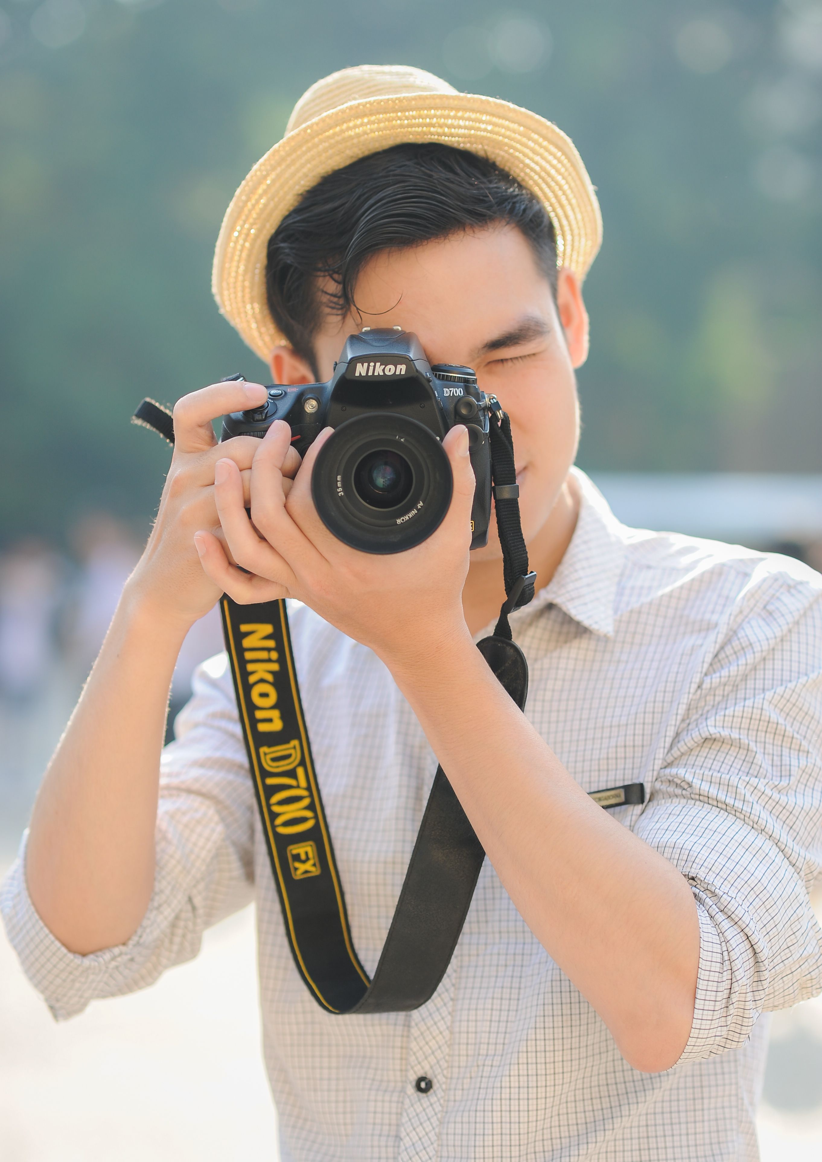 Person Holding Dslr Camera on Excavator · Free Stock Photo