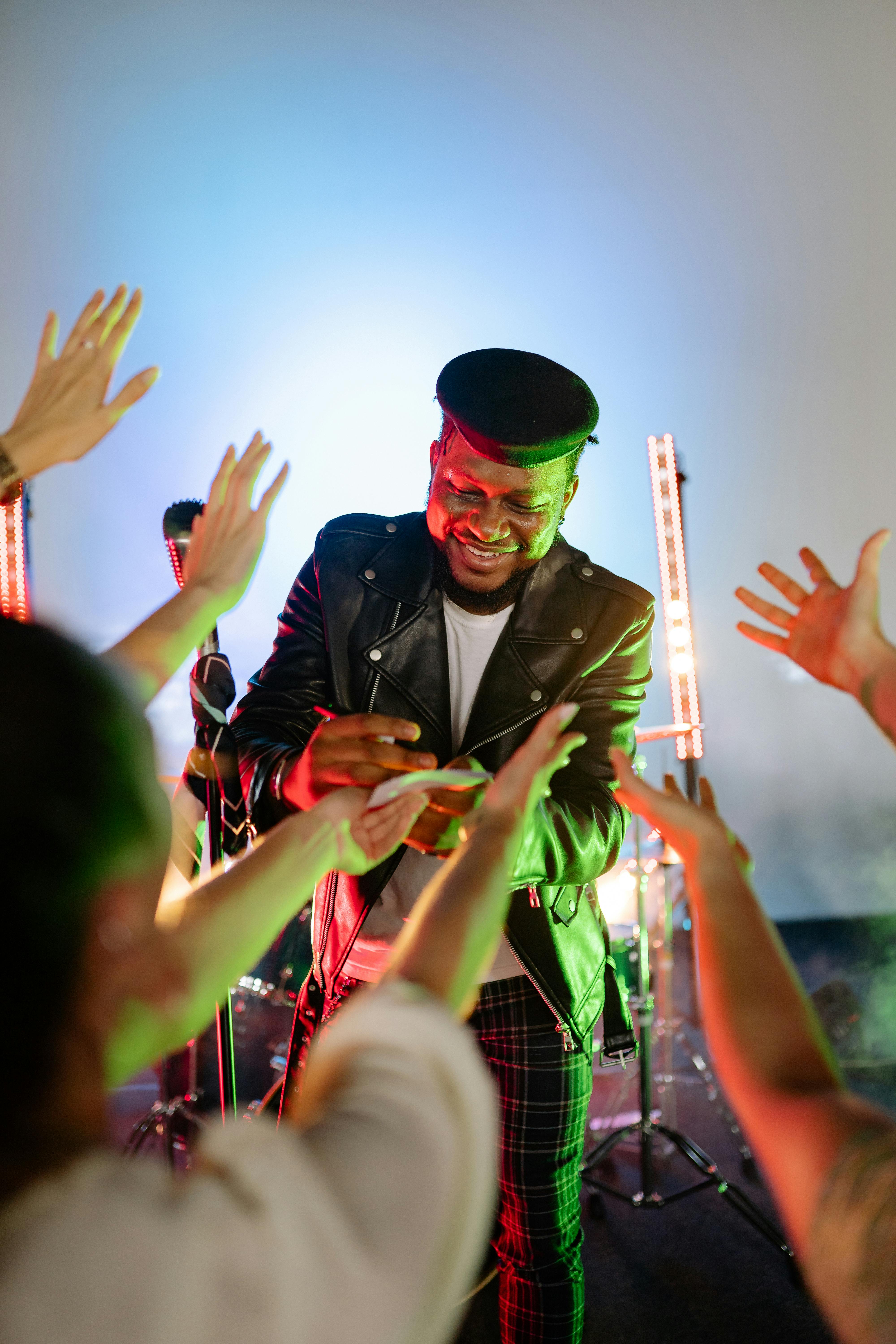 A Musician Giving an Autograph · Free Stock Photo