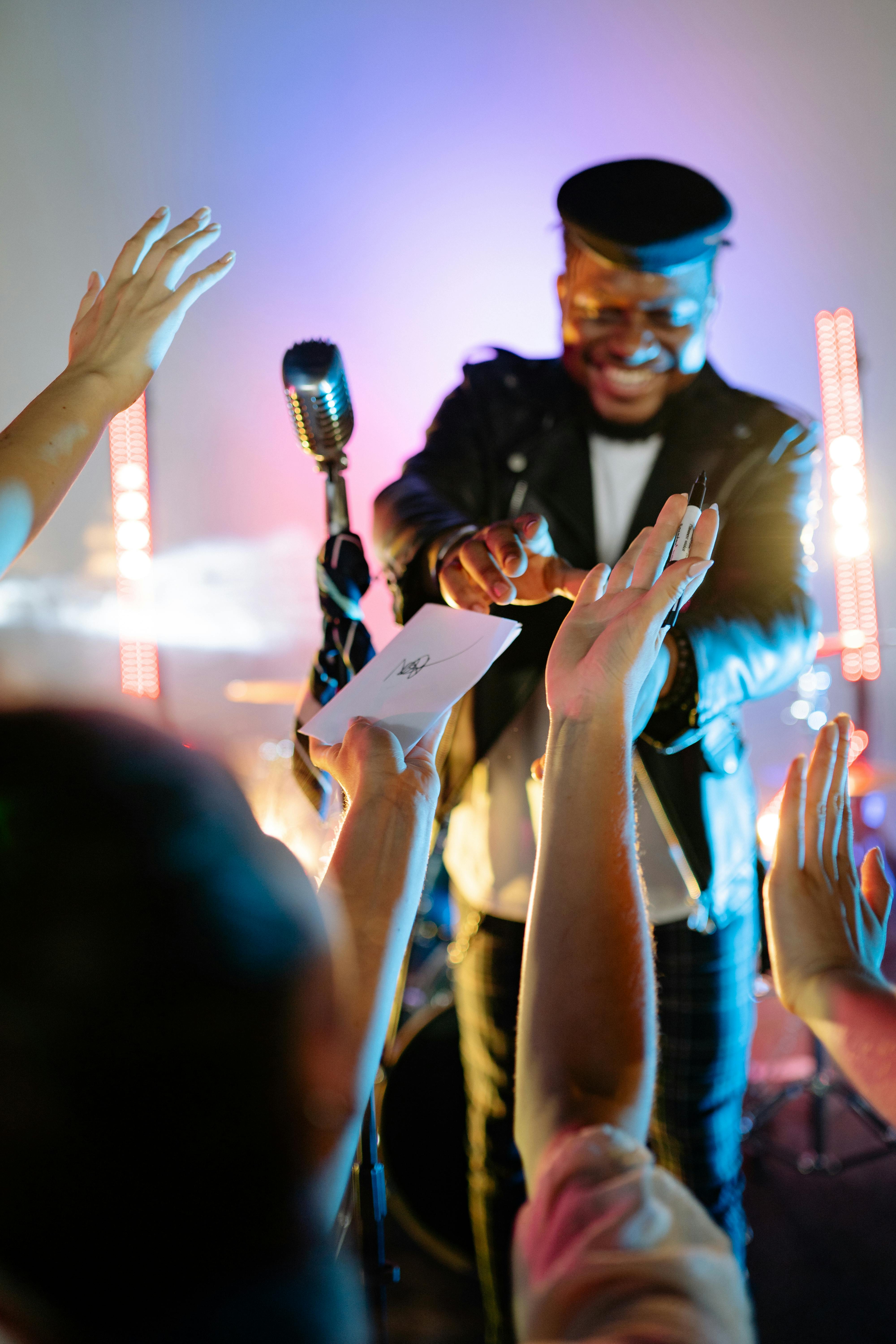 Shirtless Singer on Stage · Free Stock Photo