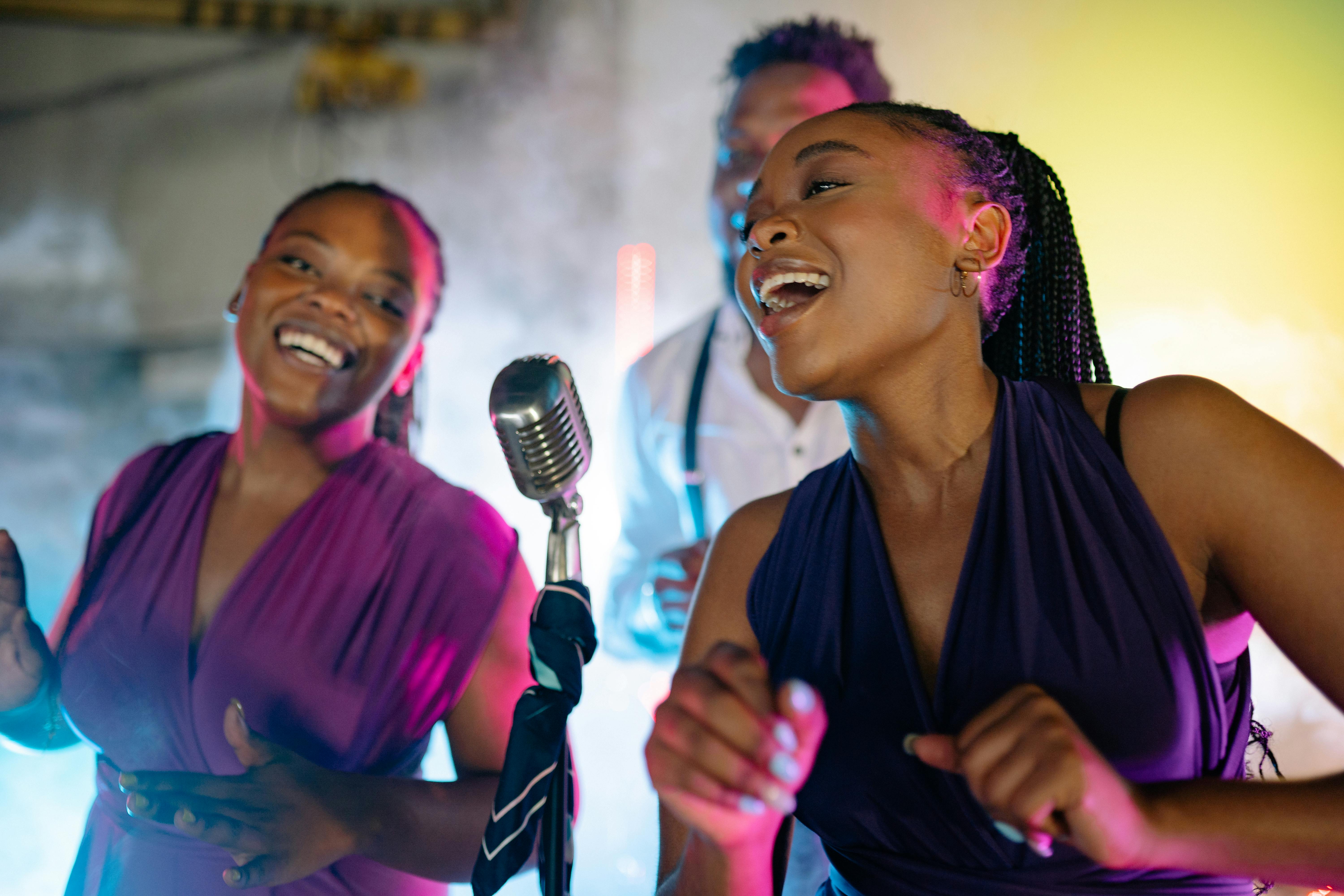 Beautiful Singers Singing a Song together · Free Stock Photo