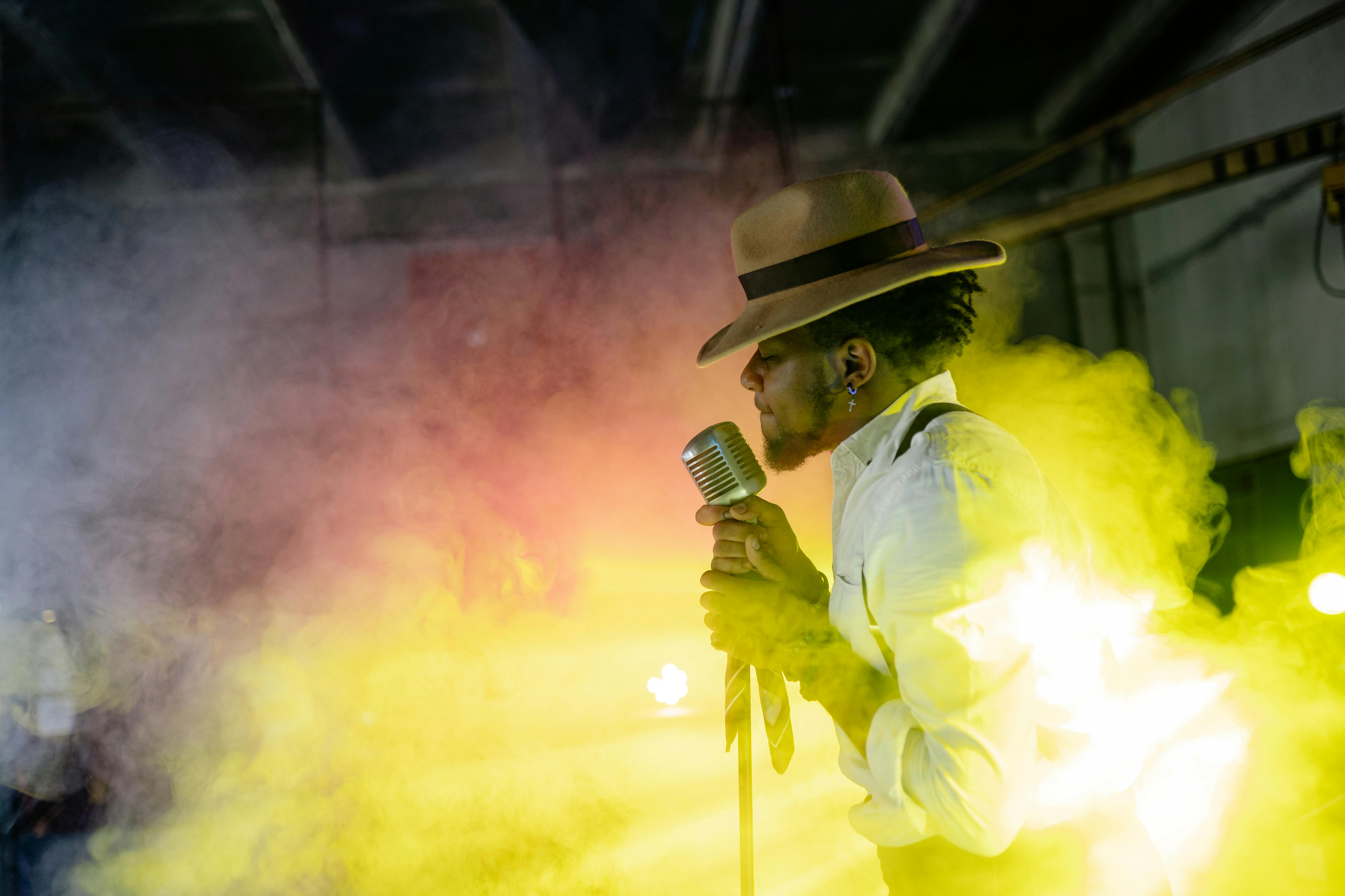 Man Standing with Steam Blowing Out · Free Stock Photo