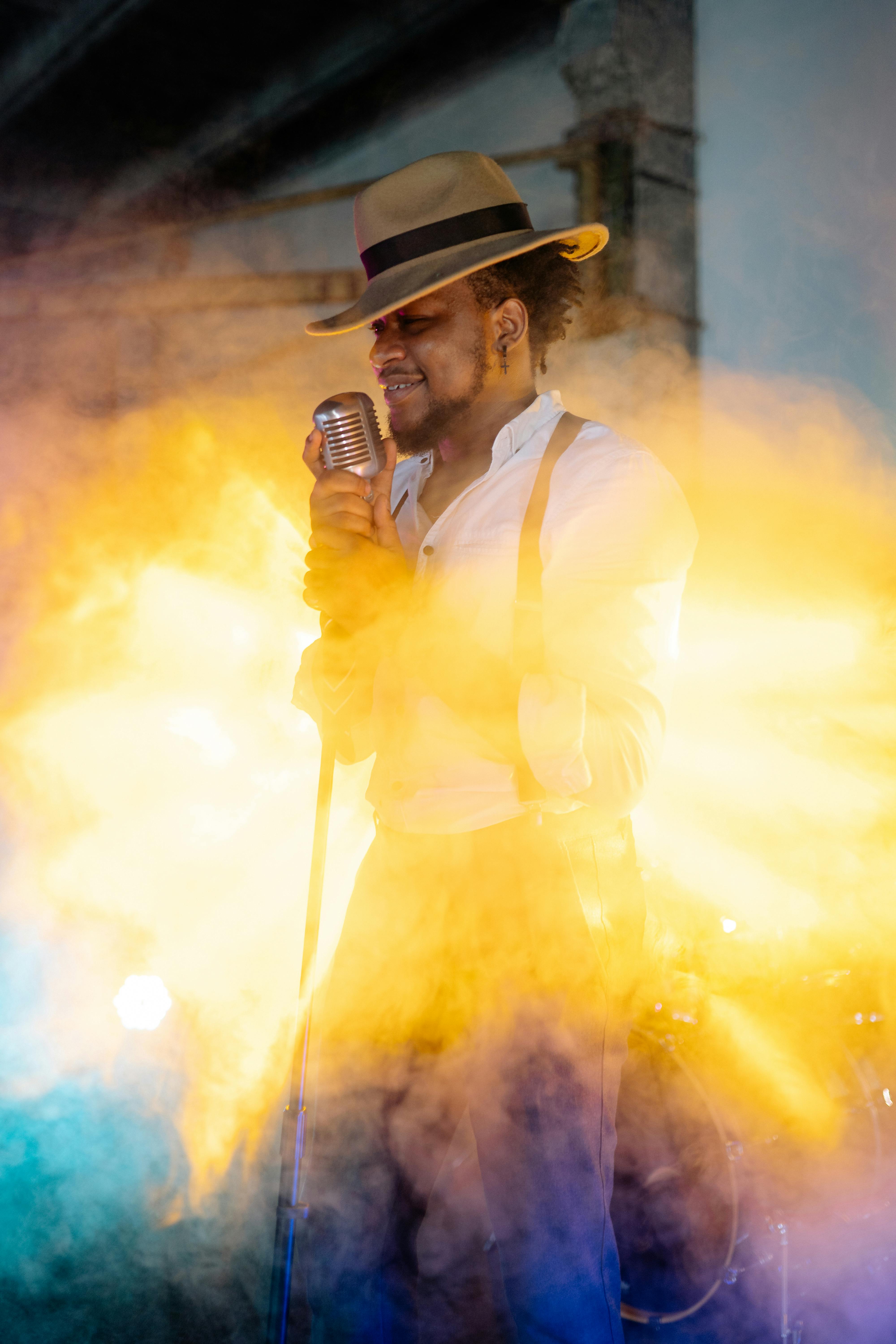 A Female Singer Singing Emotionally · Free Stock Photo