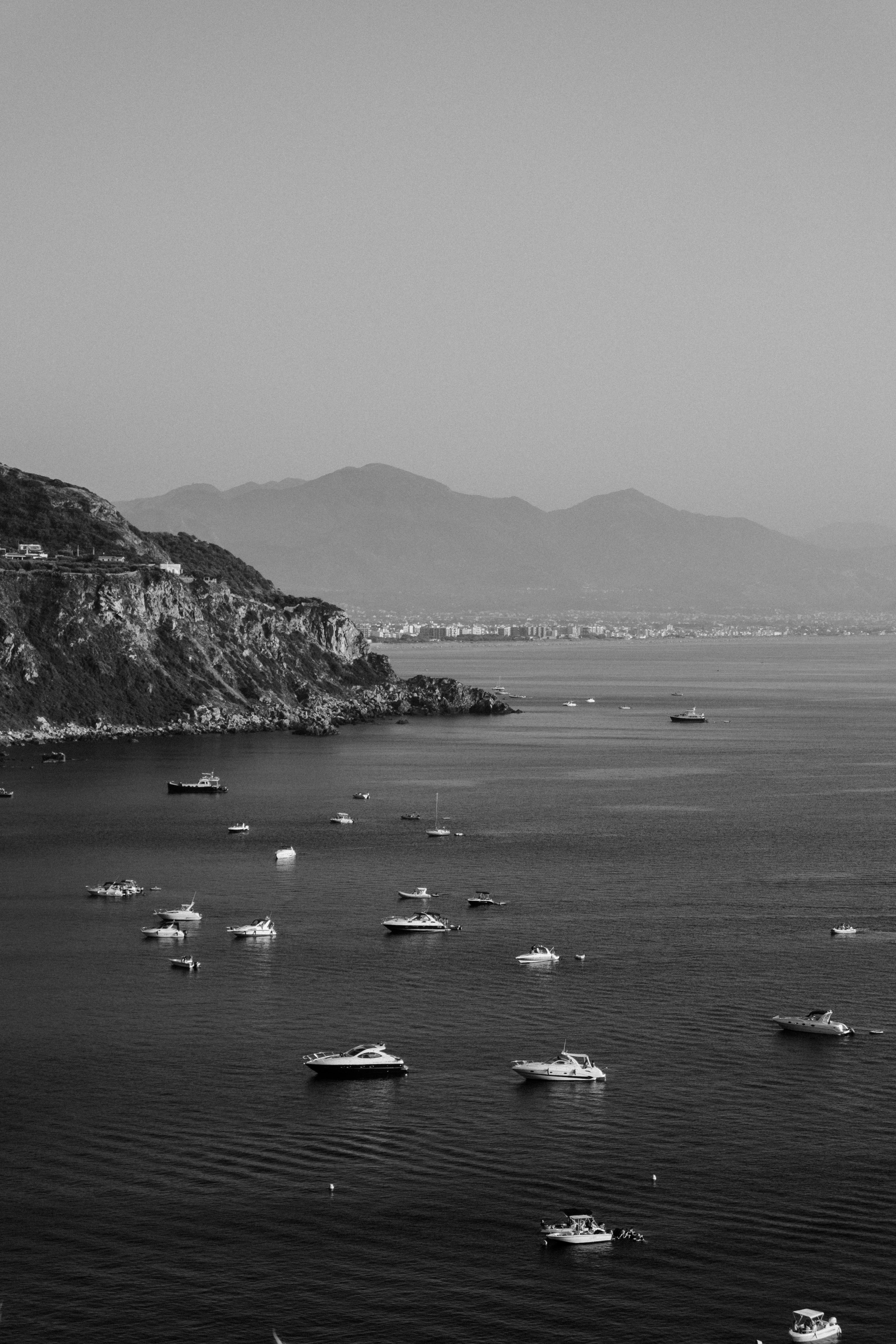 Grayscale Photography of a Boat Near the Lake · Free Stock Photo