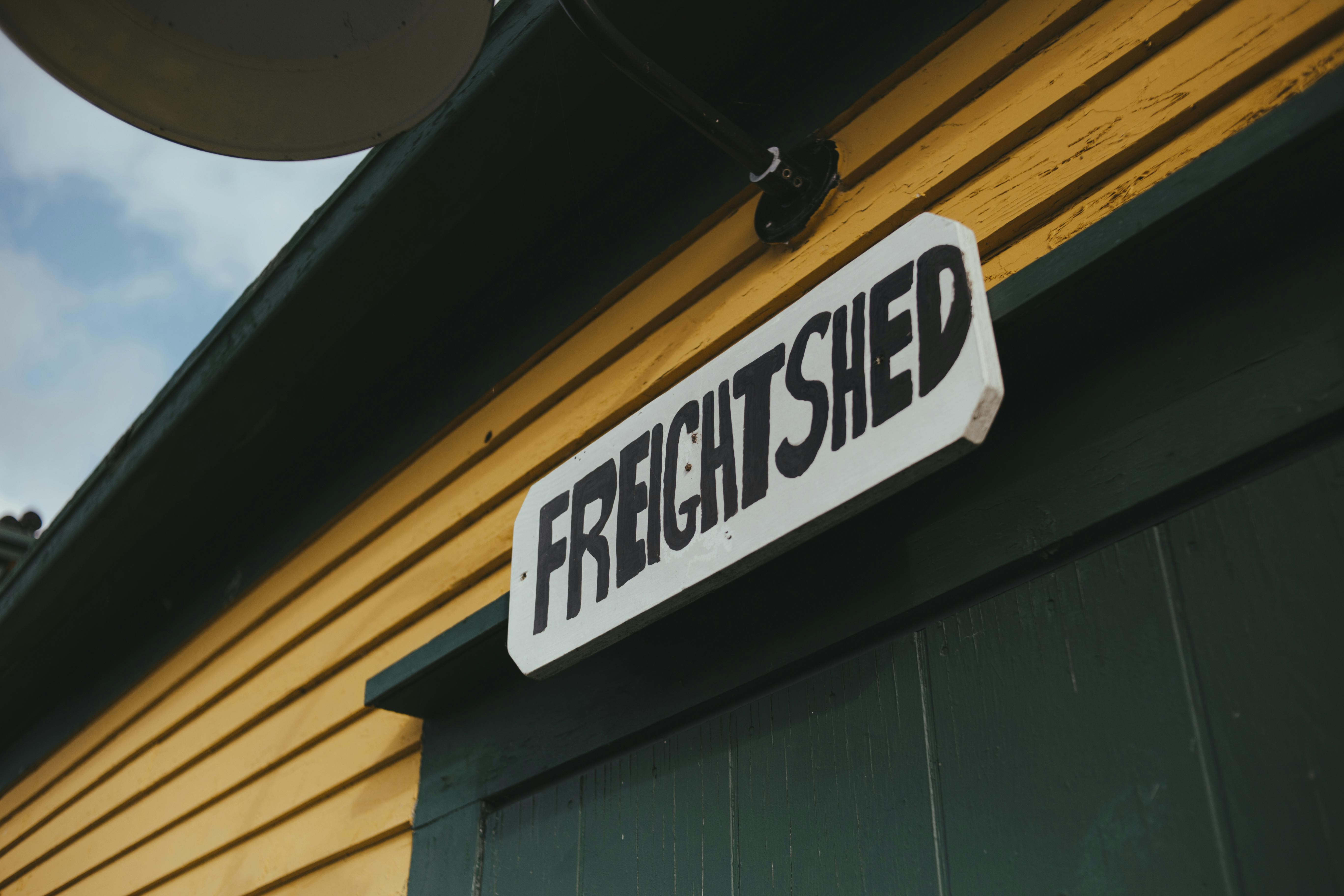 Wooden Signage in Black Letters · Free Stock Photo