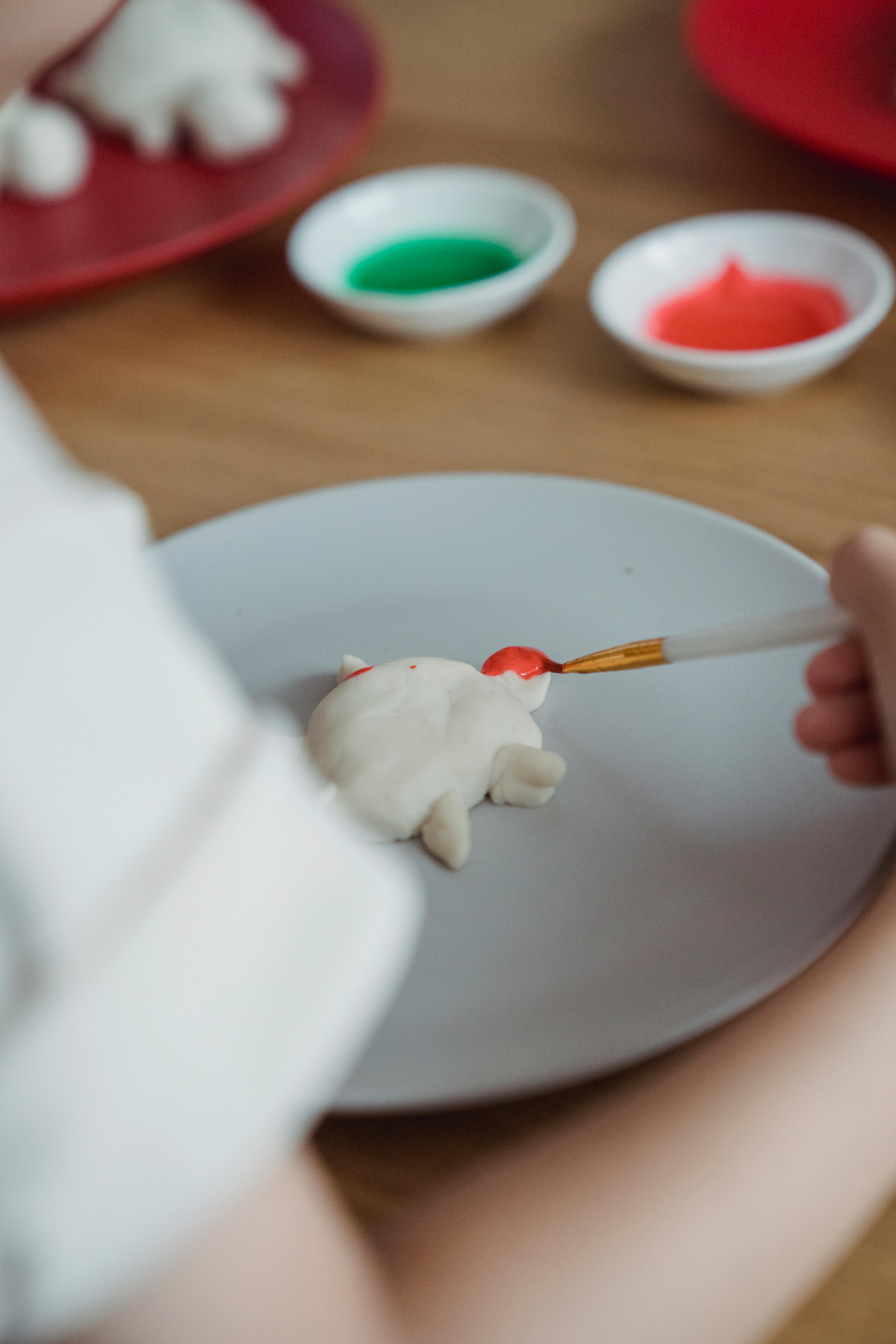 Painting a Dough with Food Coloring · Free Stock Photo