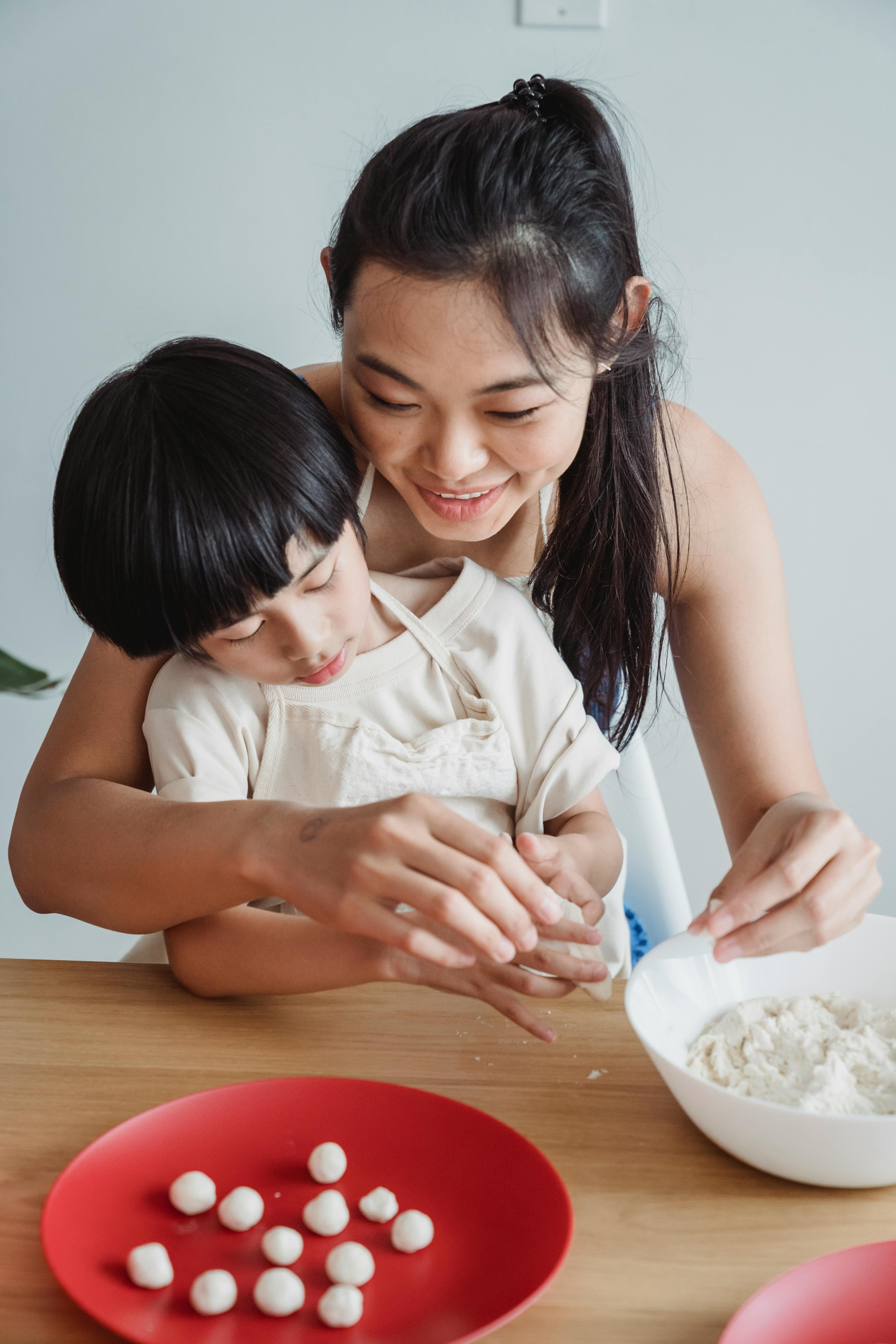 Mother Teaching Child to Cook · Free Stock Photo