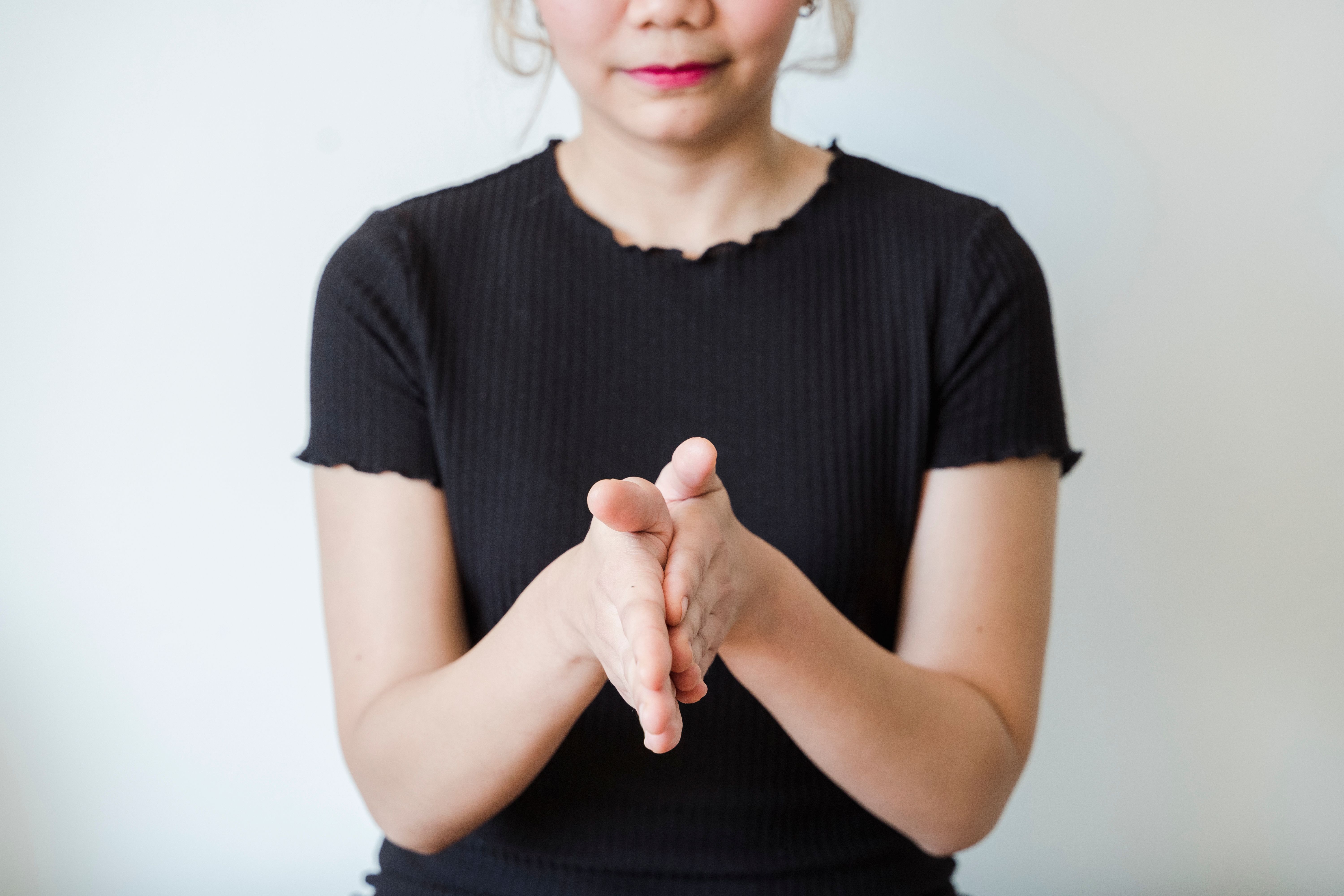 A Woman Making Hand Signal · Free Stock Photo