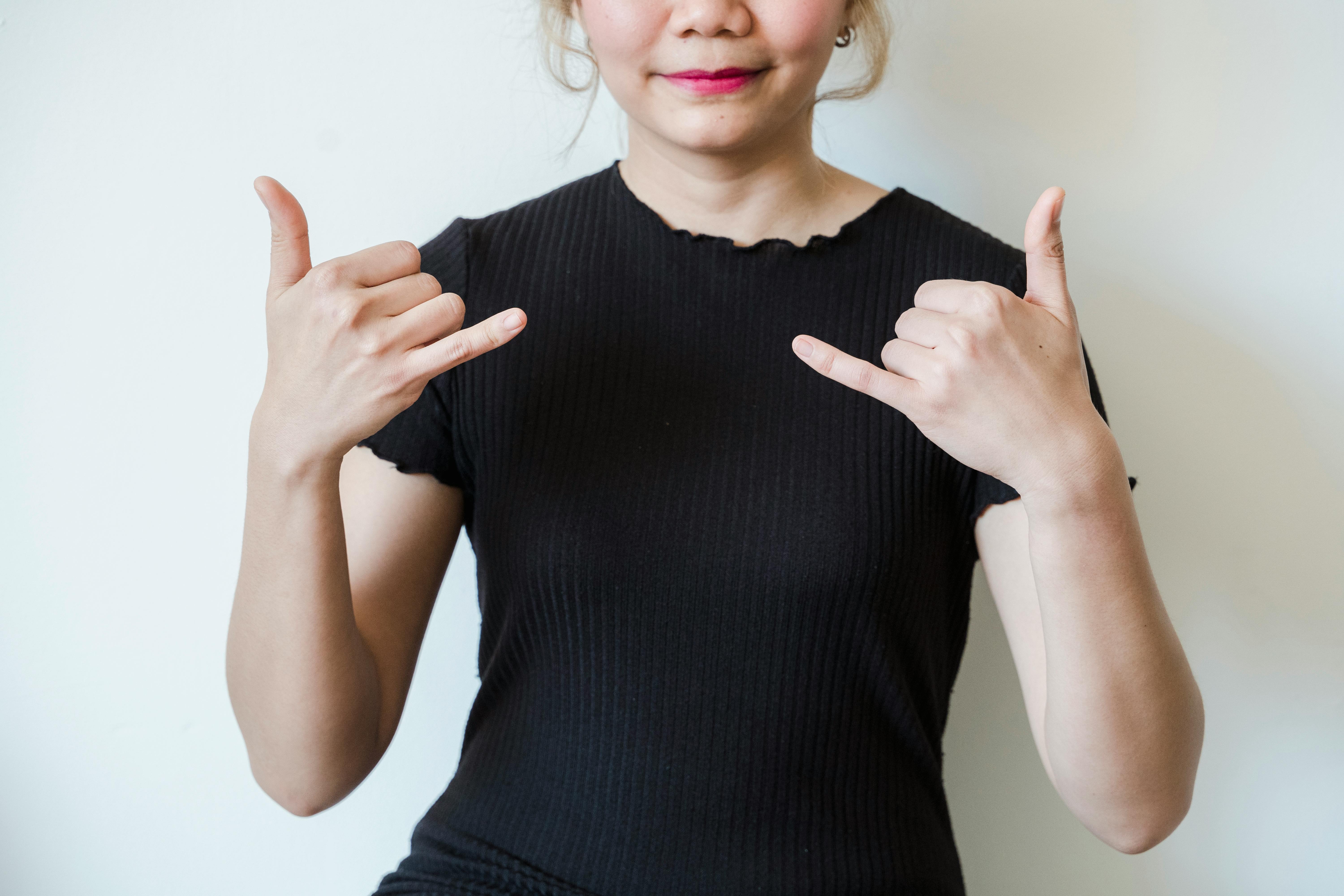 A Woman Doing Hand Gestures · Free Stock Photo