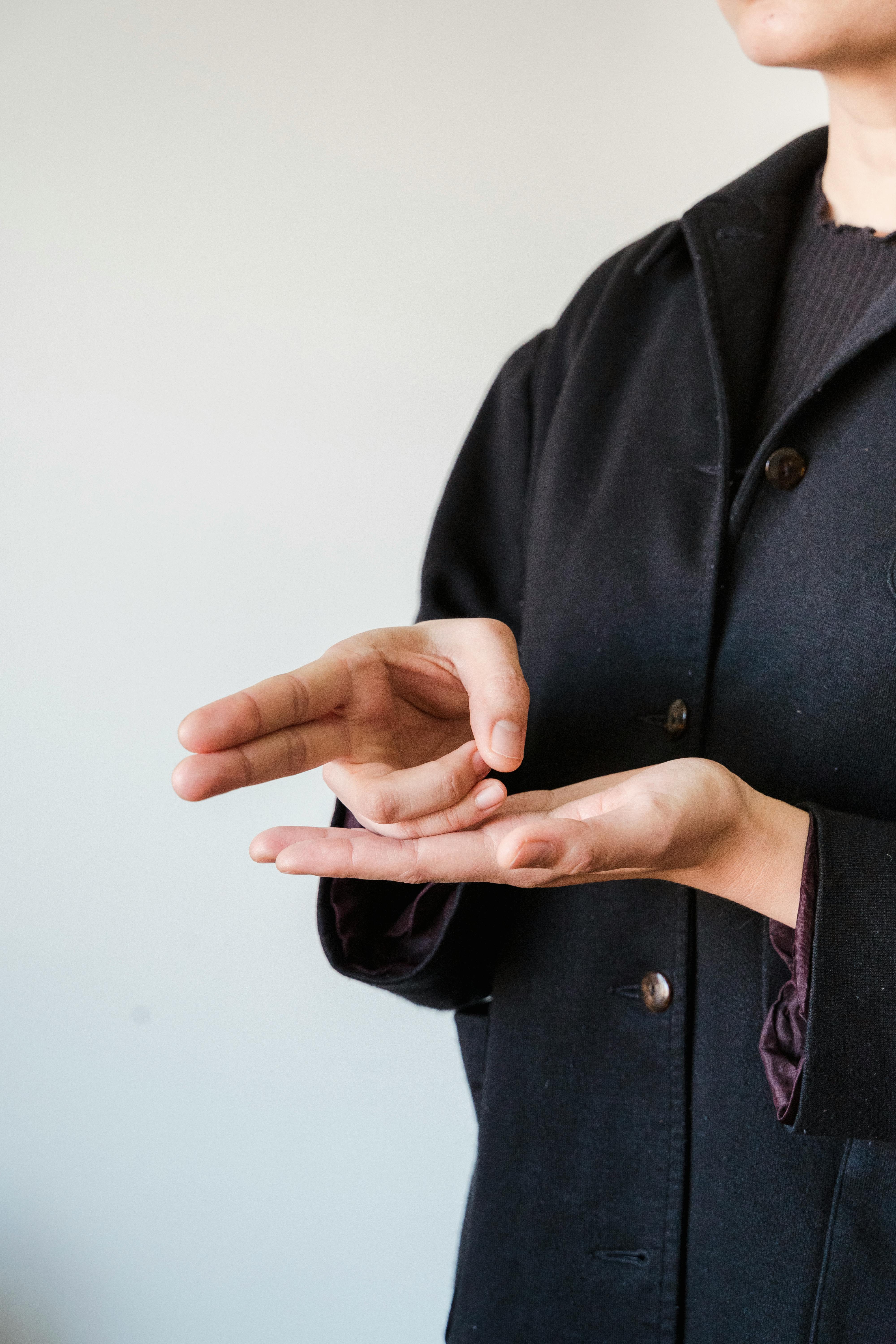 A Person Doing Sign Language · Free Stock Photo