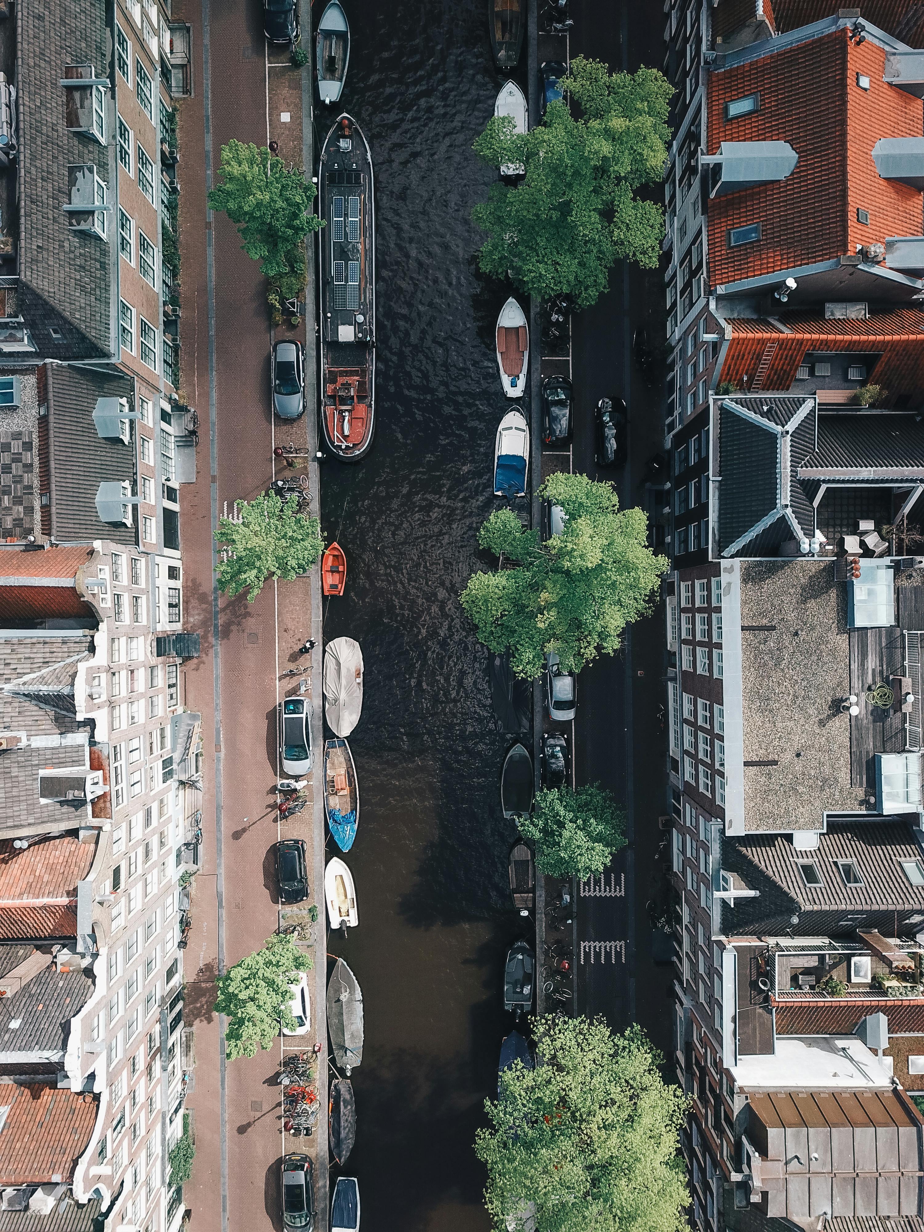 River in Between Buildings · Free Stock Photo