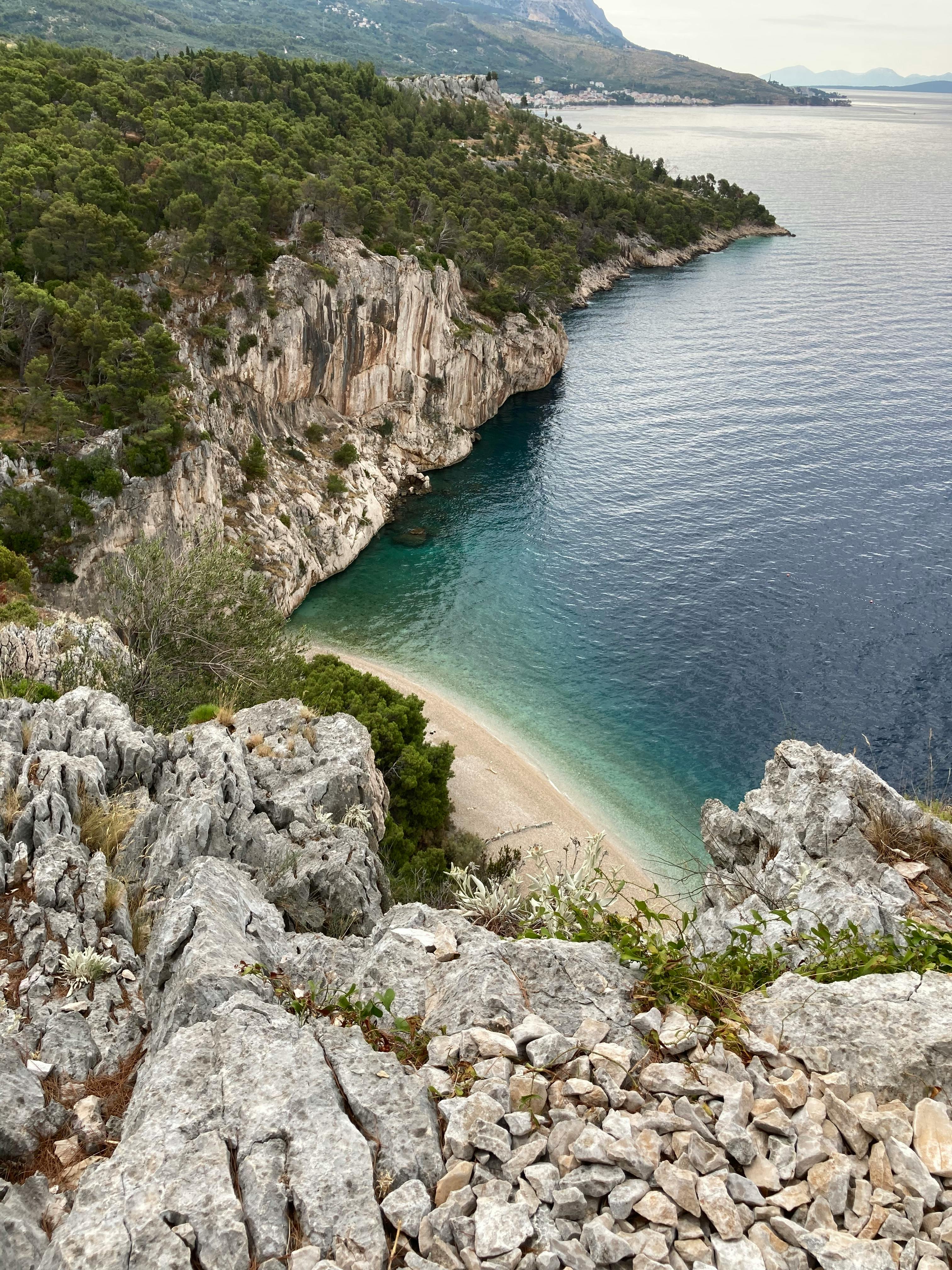 Aerial Photography of Rocky Mountains near Ocean · Free Stock Photo