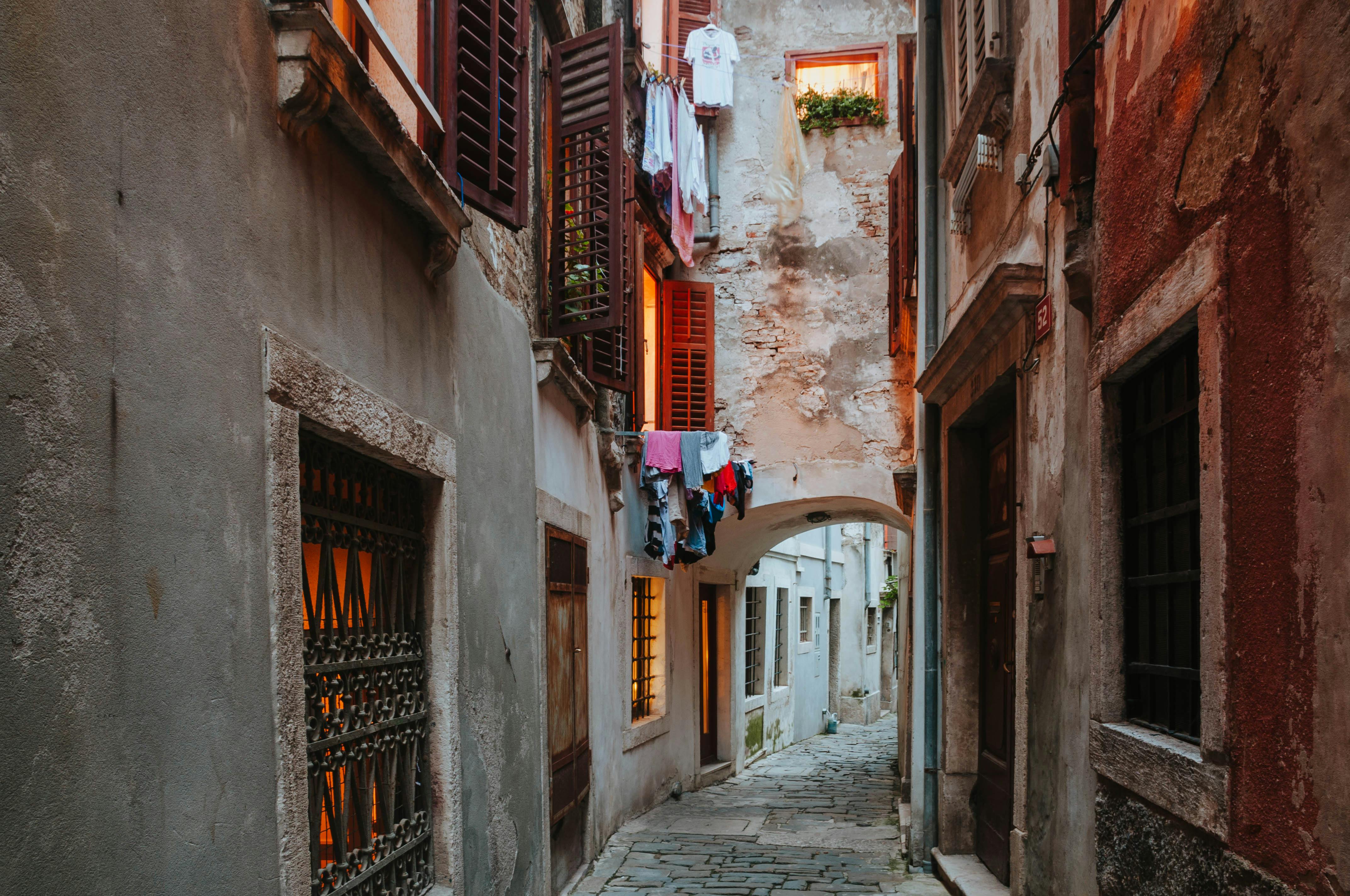 Street in between Brick Buildings · Free Stock Photo