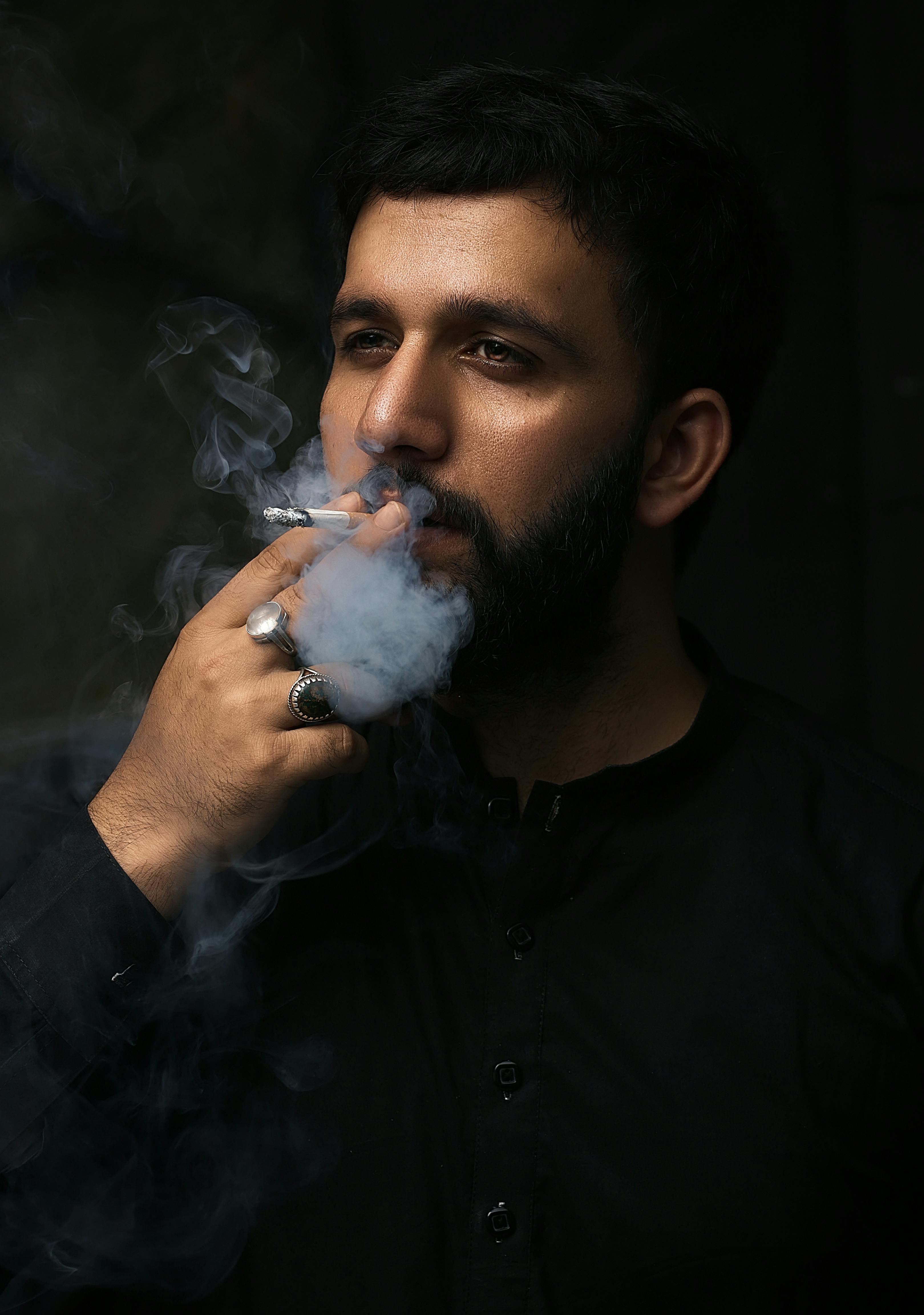 A Man Smoking Cigarette · Free Stock Photo