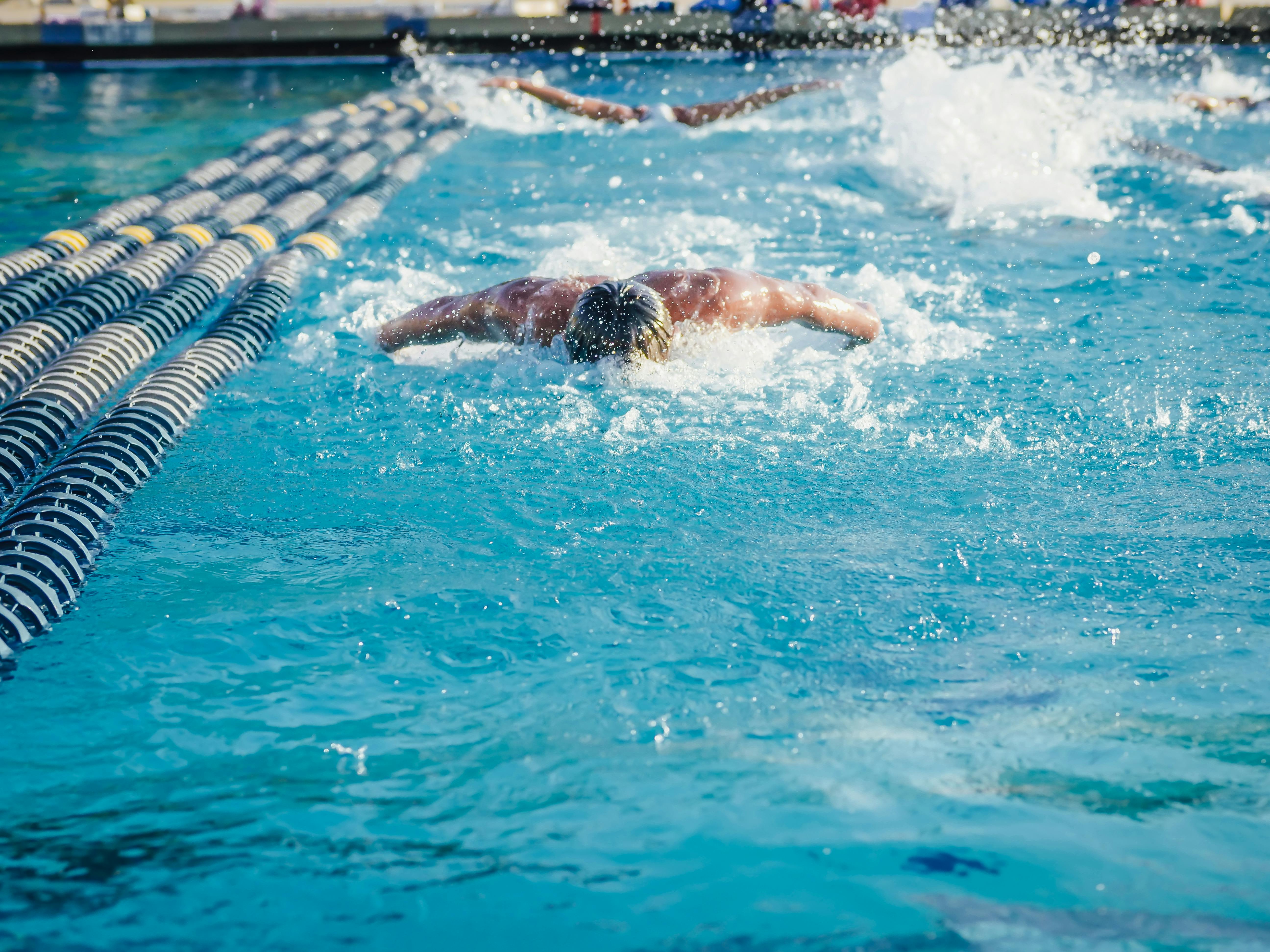 A Person Swimming in the Pool · Free Stock Photo
