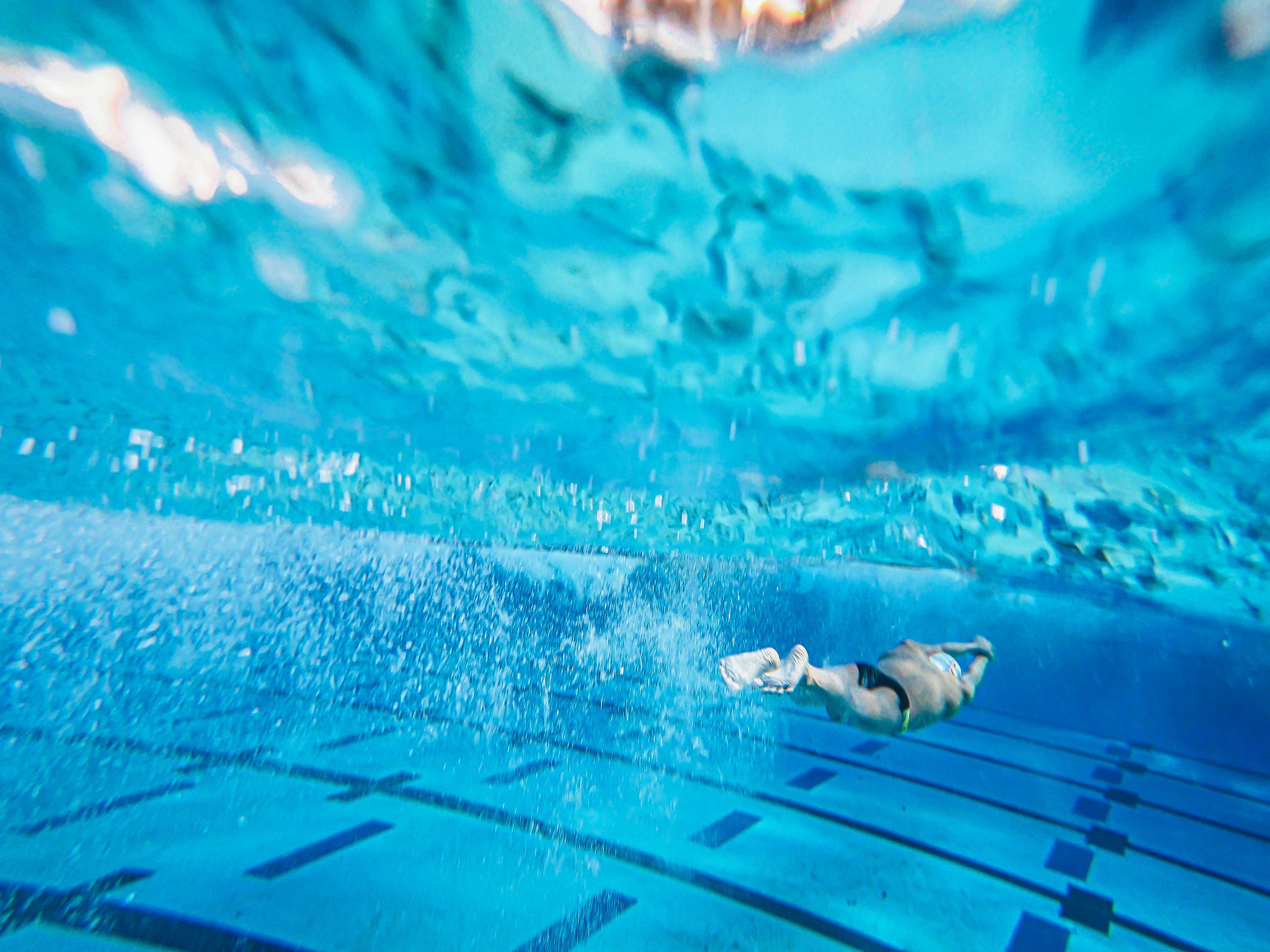 A Person Swimming Underwater · Free Stock Photo
