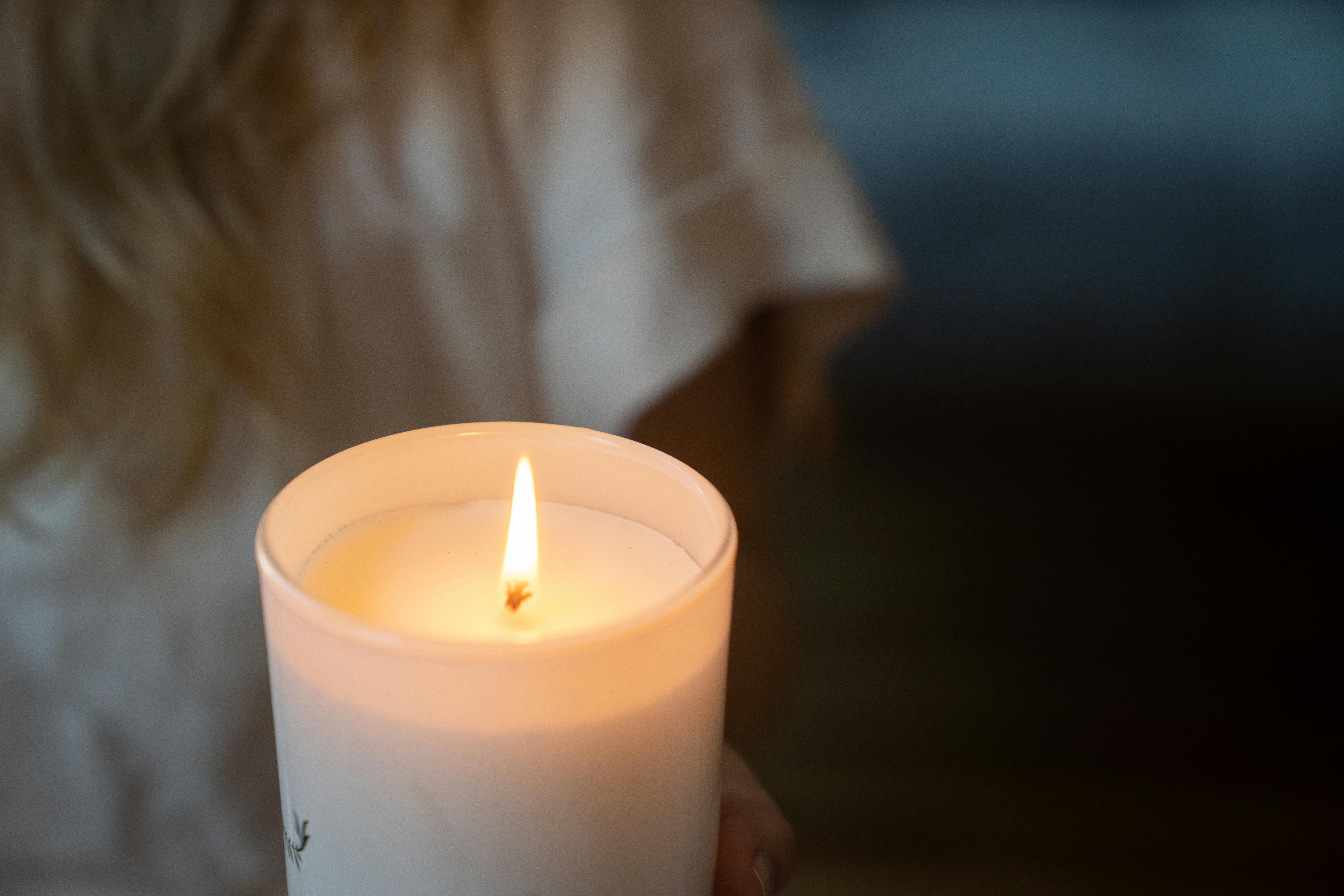 A Person Holding a Candle Holder · Free Stock Photo
