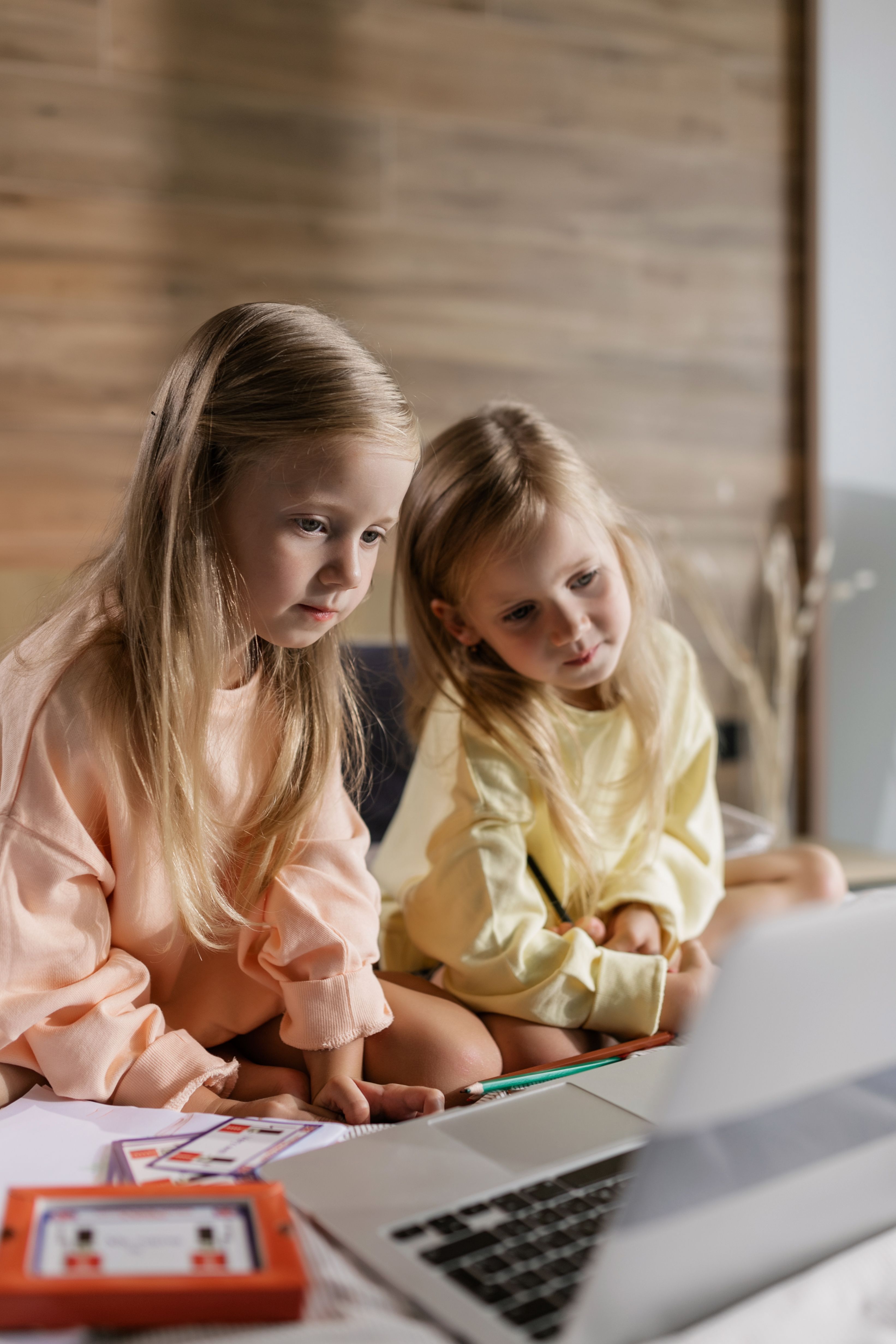 Twin Girls Doing Online Learning at Home · Free Stock Photo