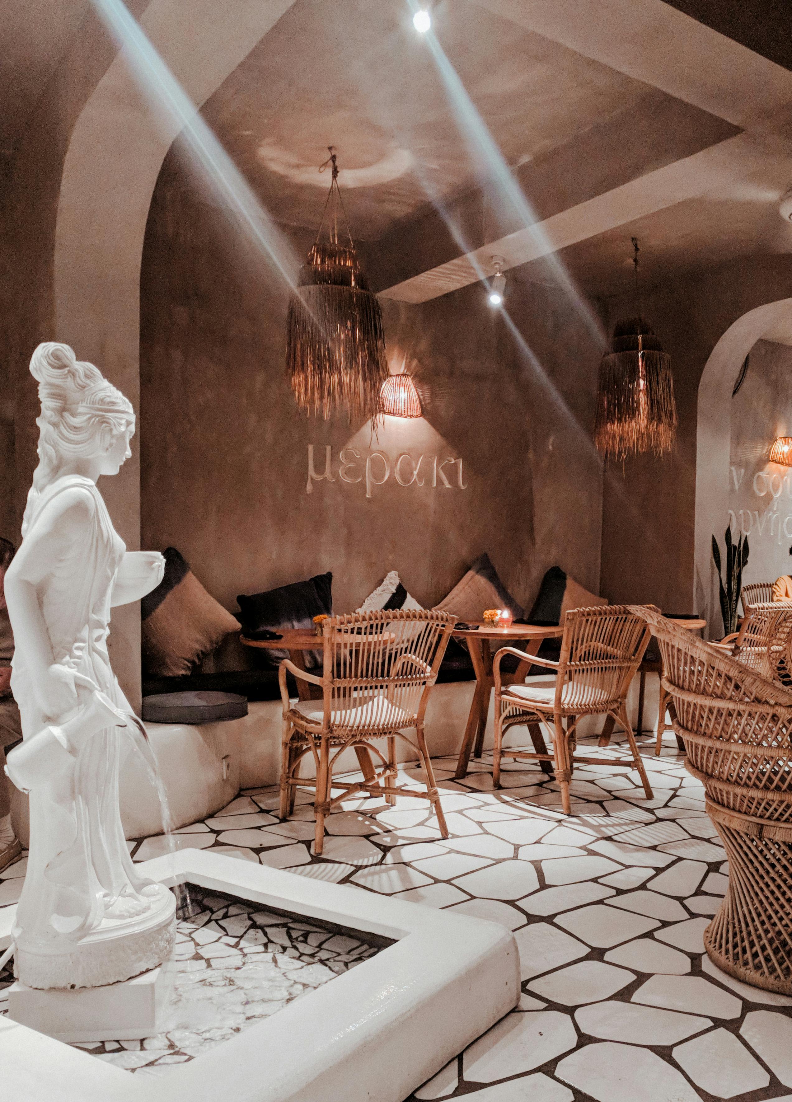 A Water Fountain with a Sculpture at a Restaurant · Free Stock Photo