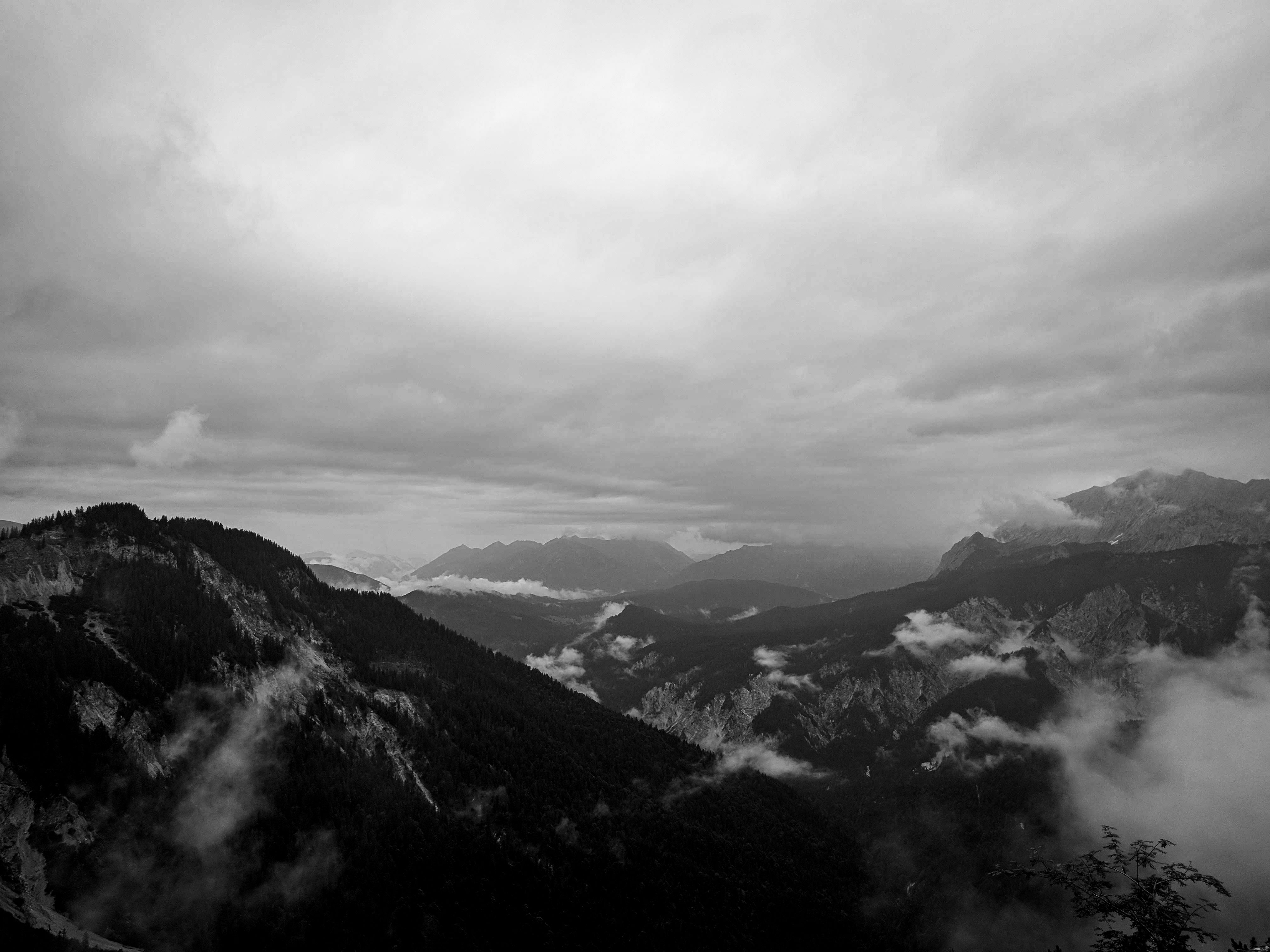 Grayscale Photo of Mountains · Free Stock Photo