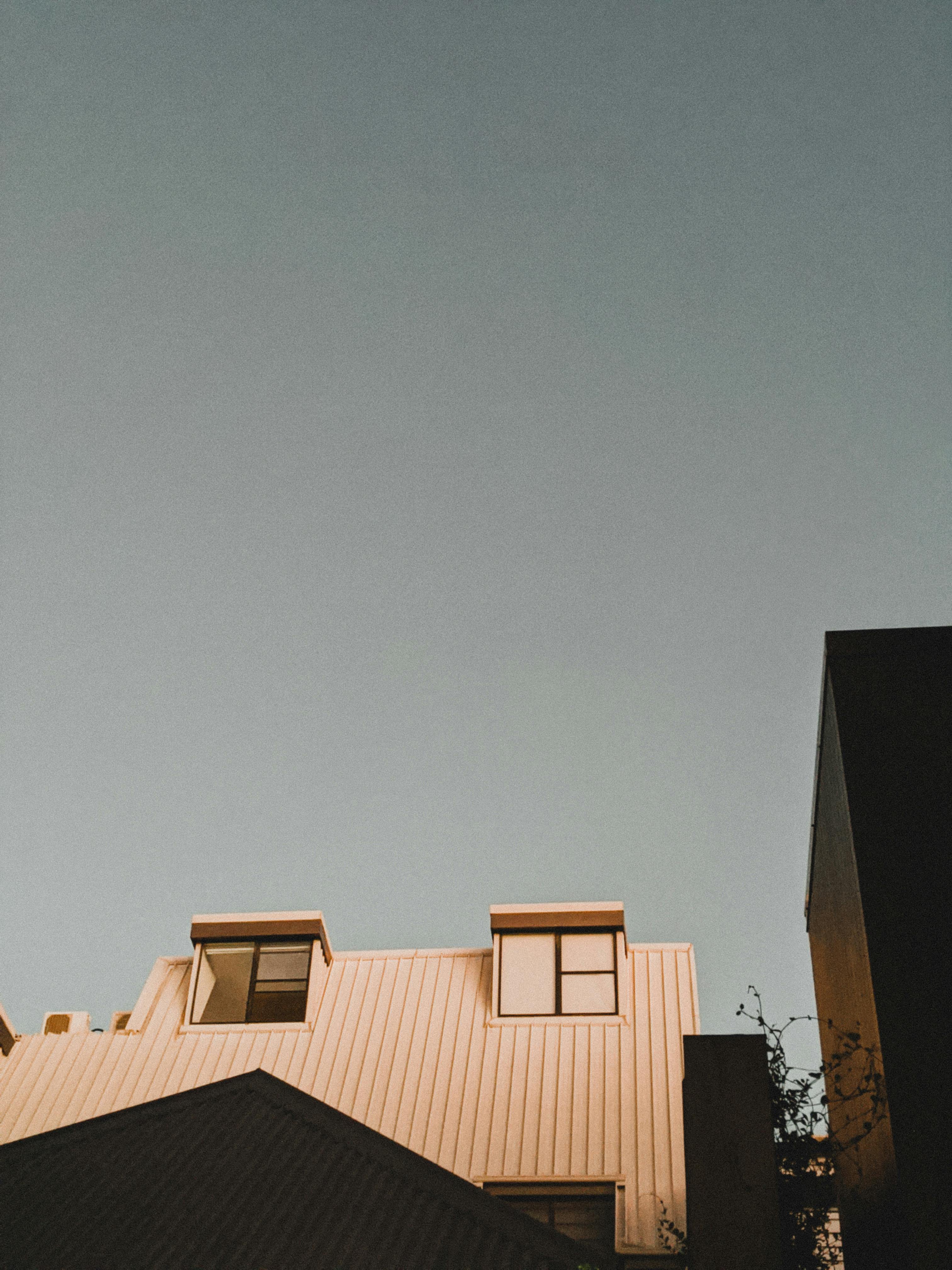 Low Angle Shot of the Windows of a Minimalist House · Free Stock Photo