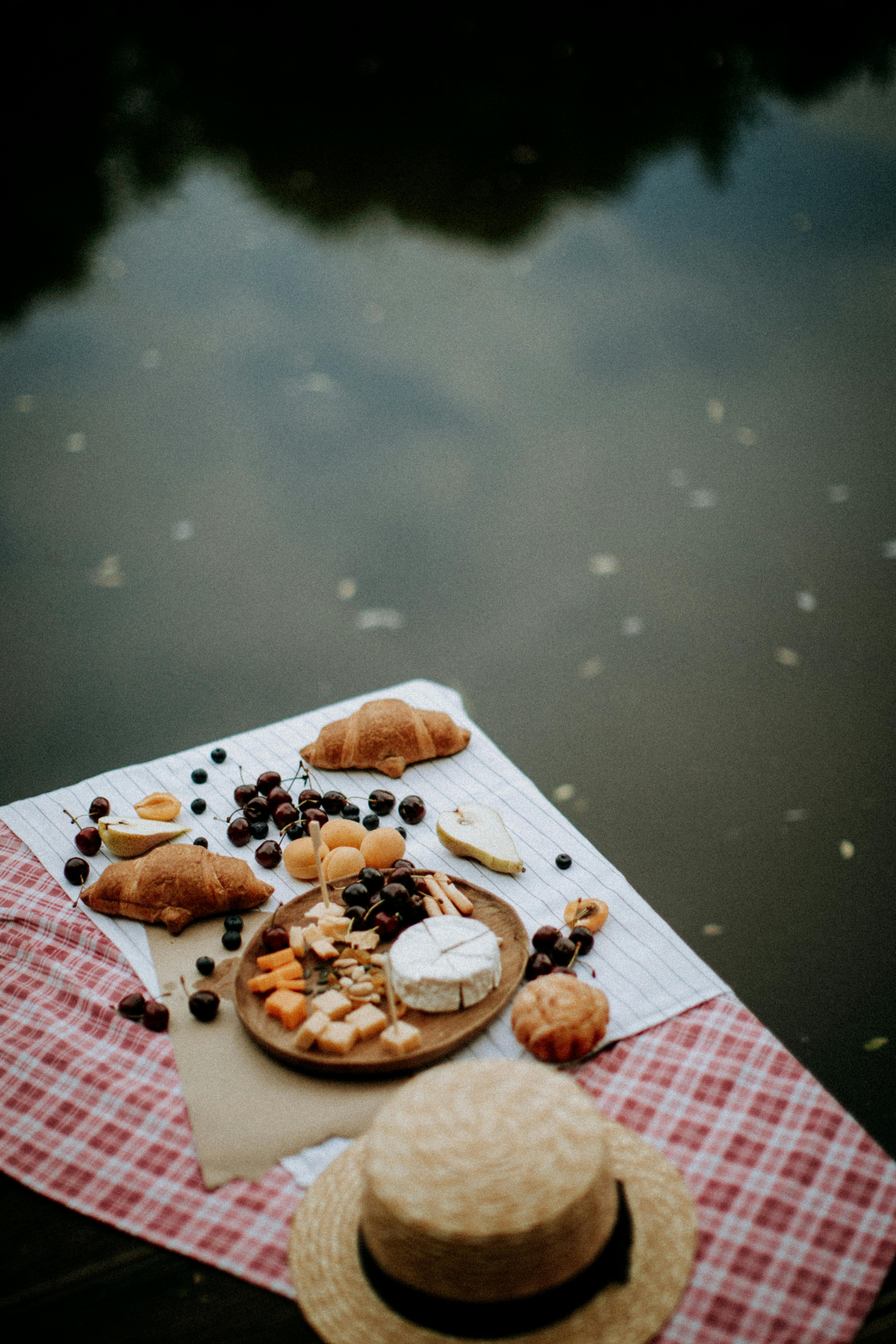 Foods over a Table by the Lake · Free Stock Photo