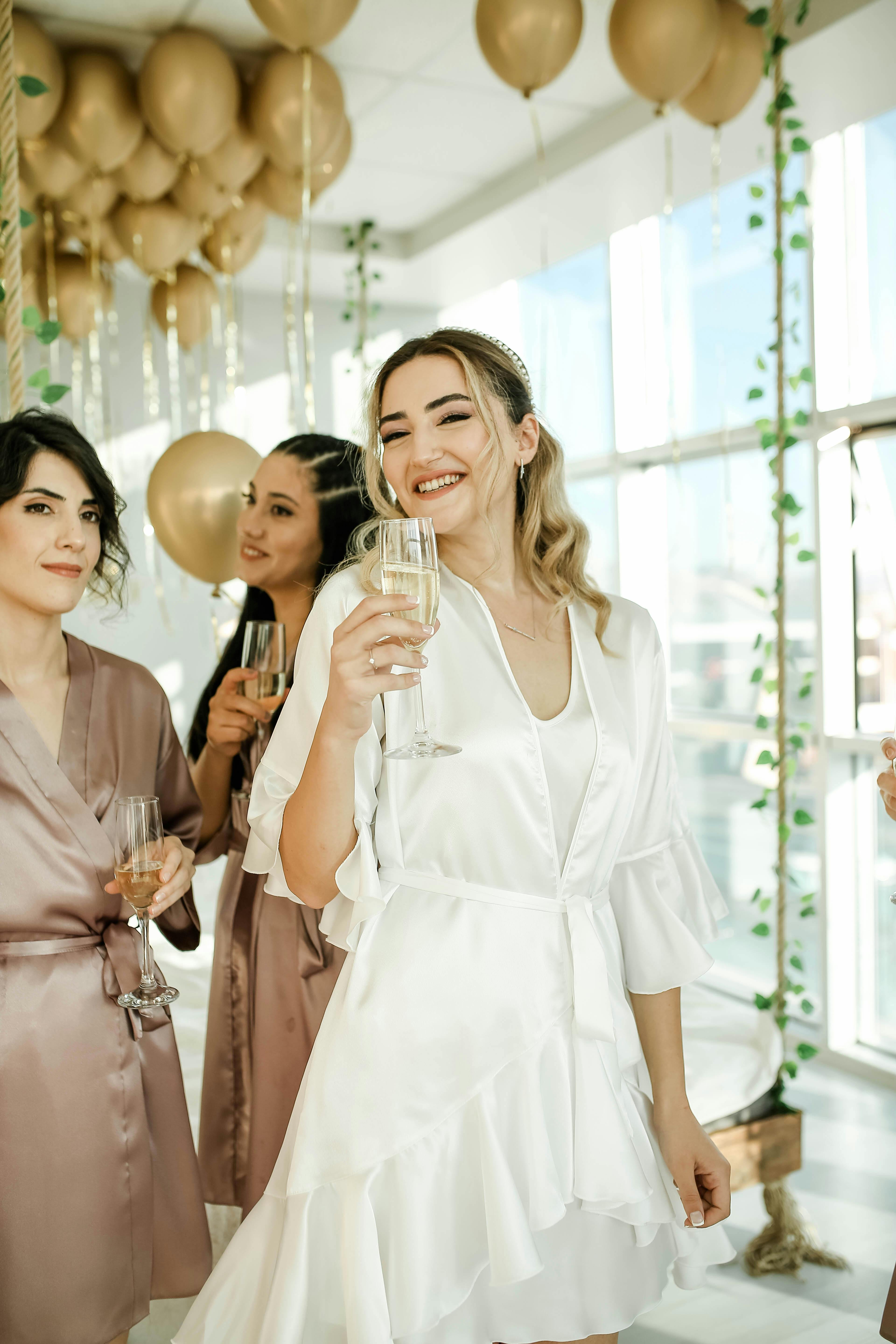 Woman Wearing White Robe Holding a Wine Glass · Free Stock Photo