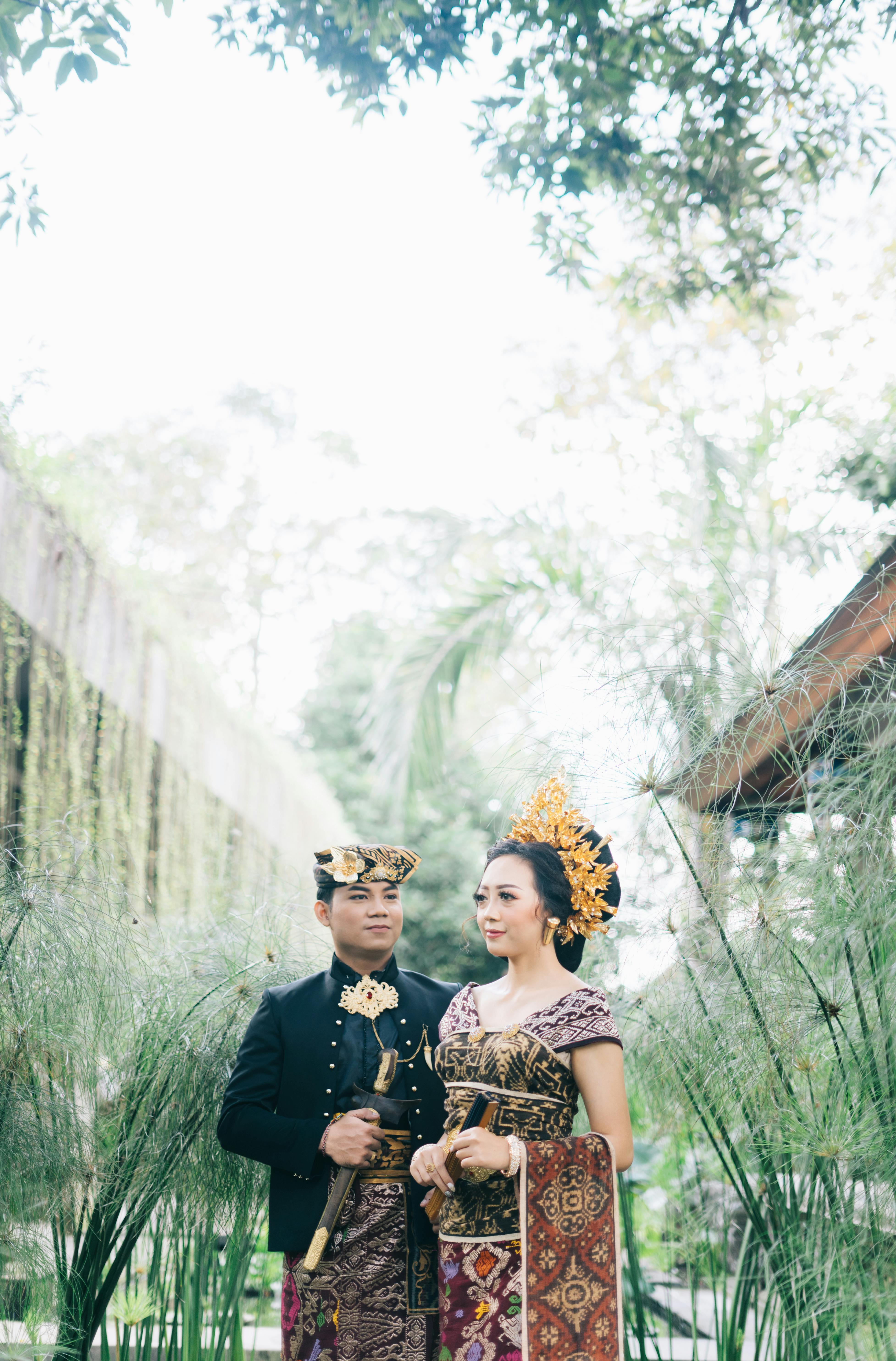 Wedding Couple in Traditional Clothing · Free Stock Photo