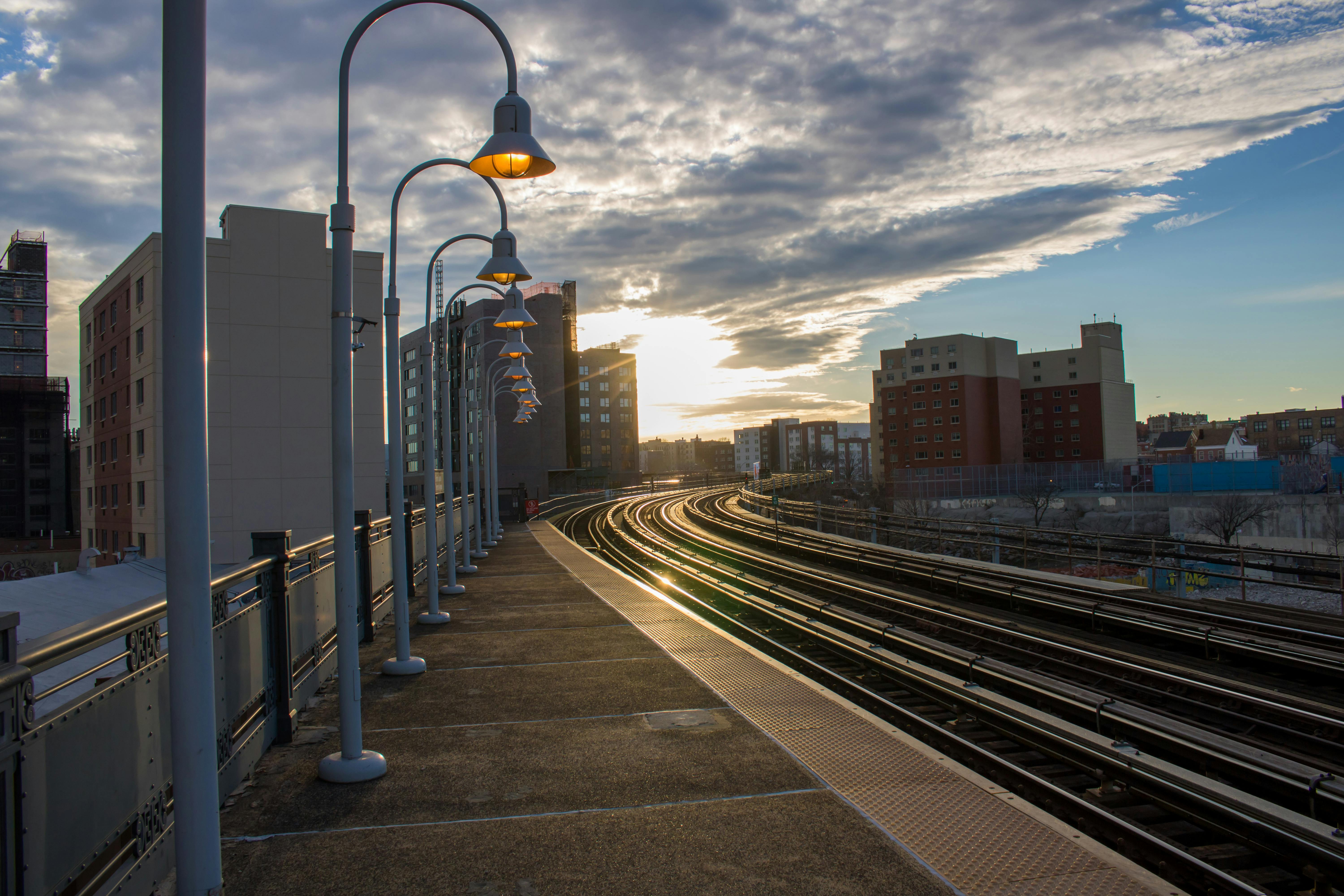 White Post Lamps Near Train Railway · Free Stock Photo