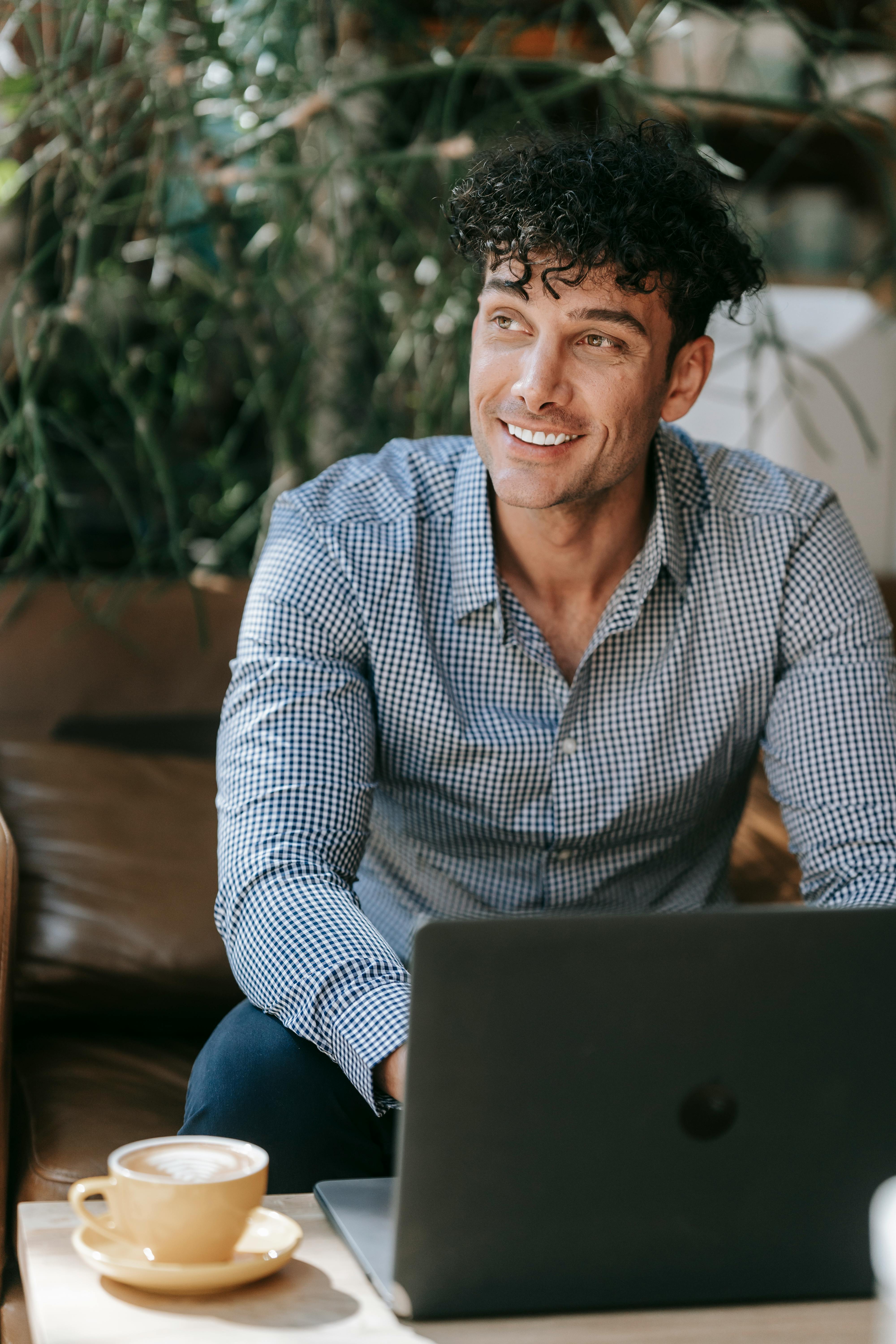 A Man Sitting at the Table · Free Stock Photo