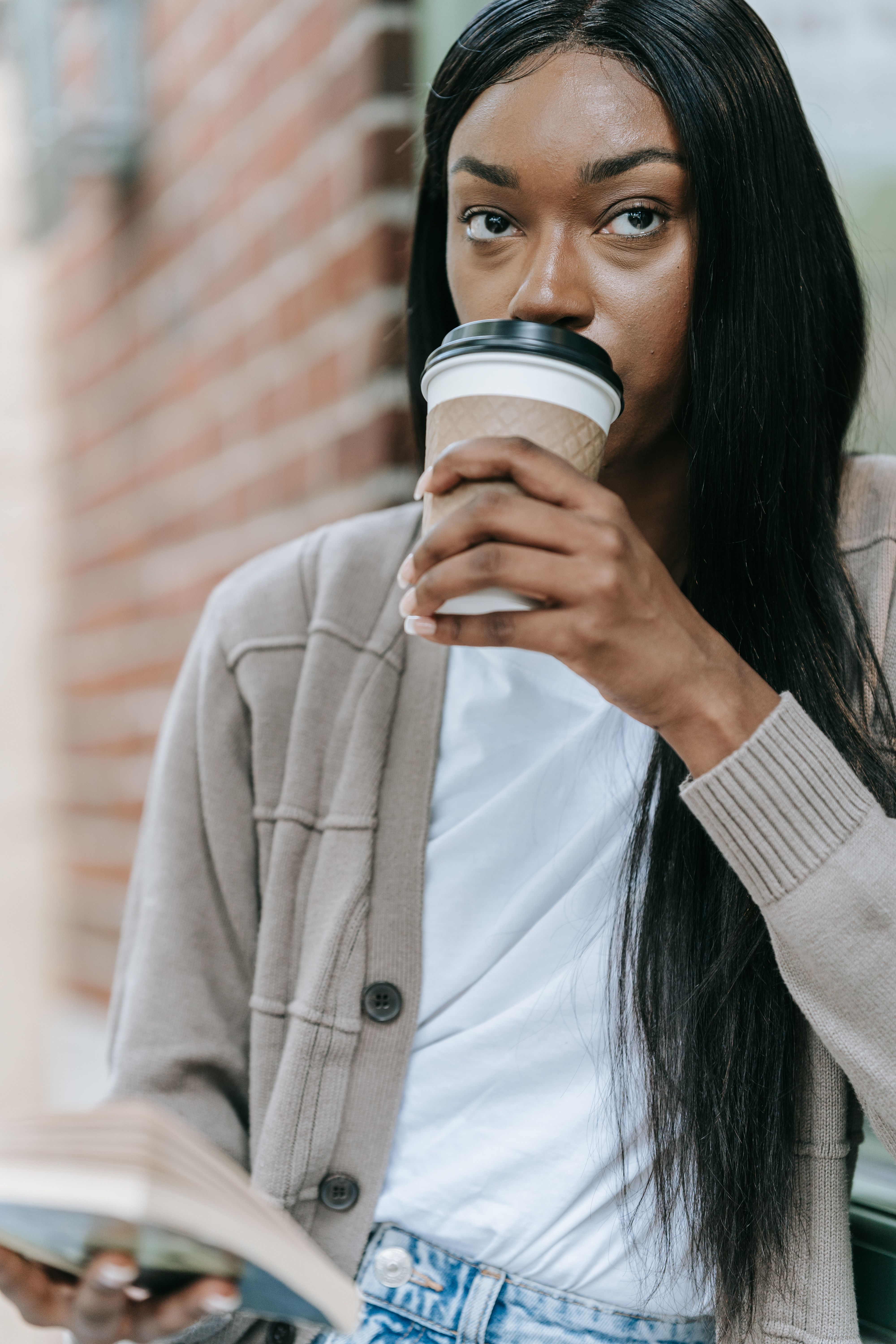 A Woman Sipping Coffee · Free Stock Photo