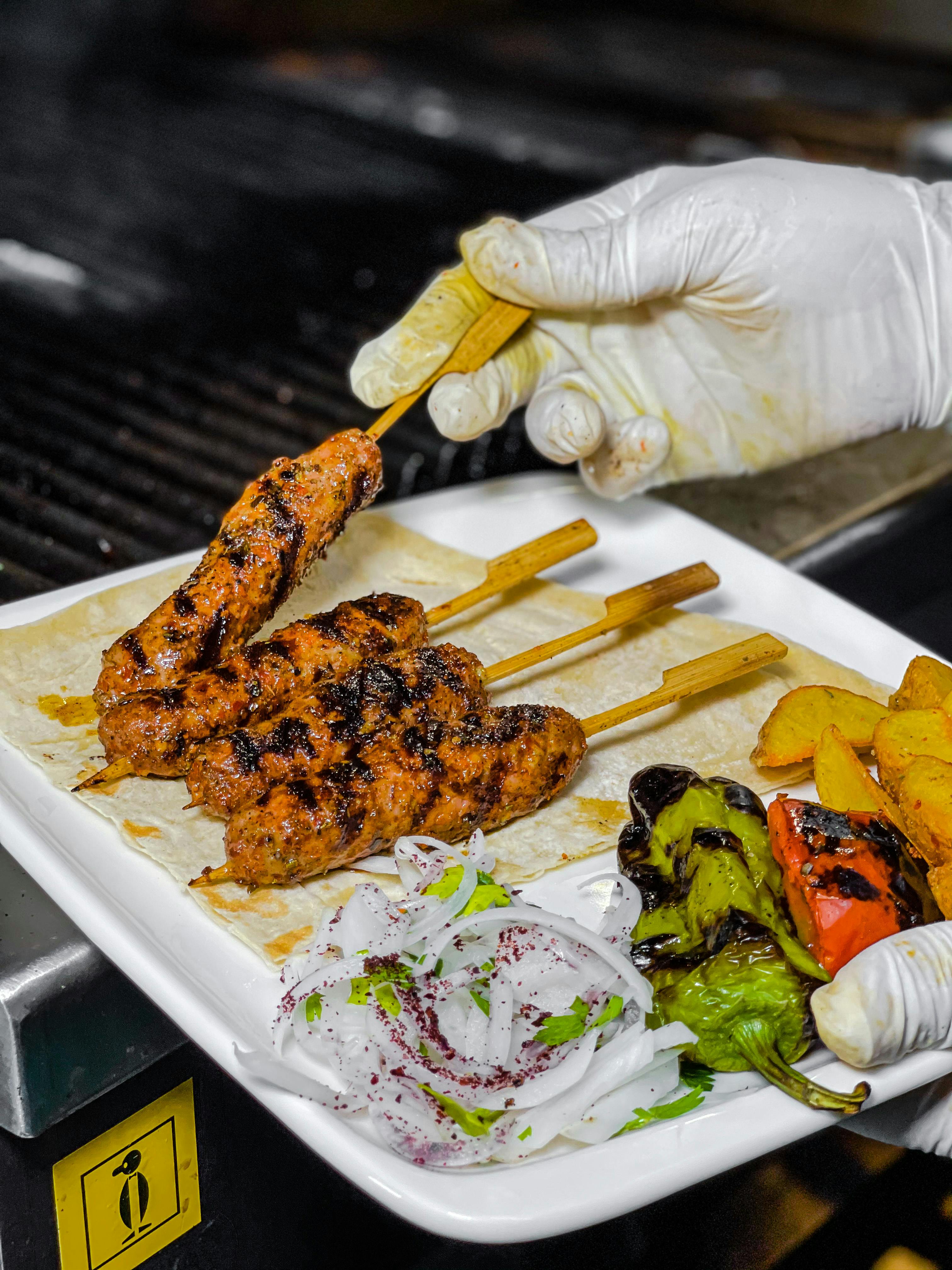 Chicken Satay and Veggies Served on a White Ceramic Plate · Free Stock ...