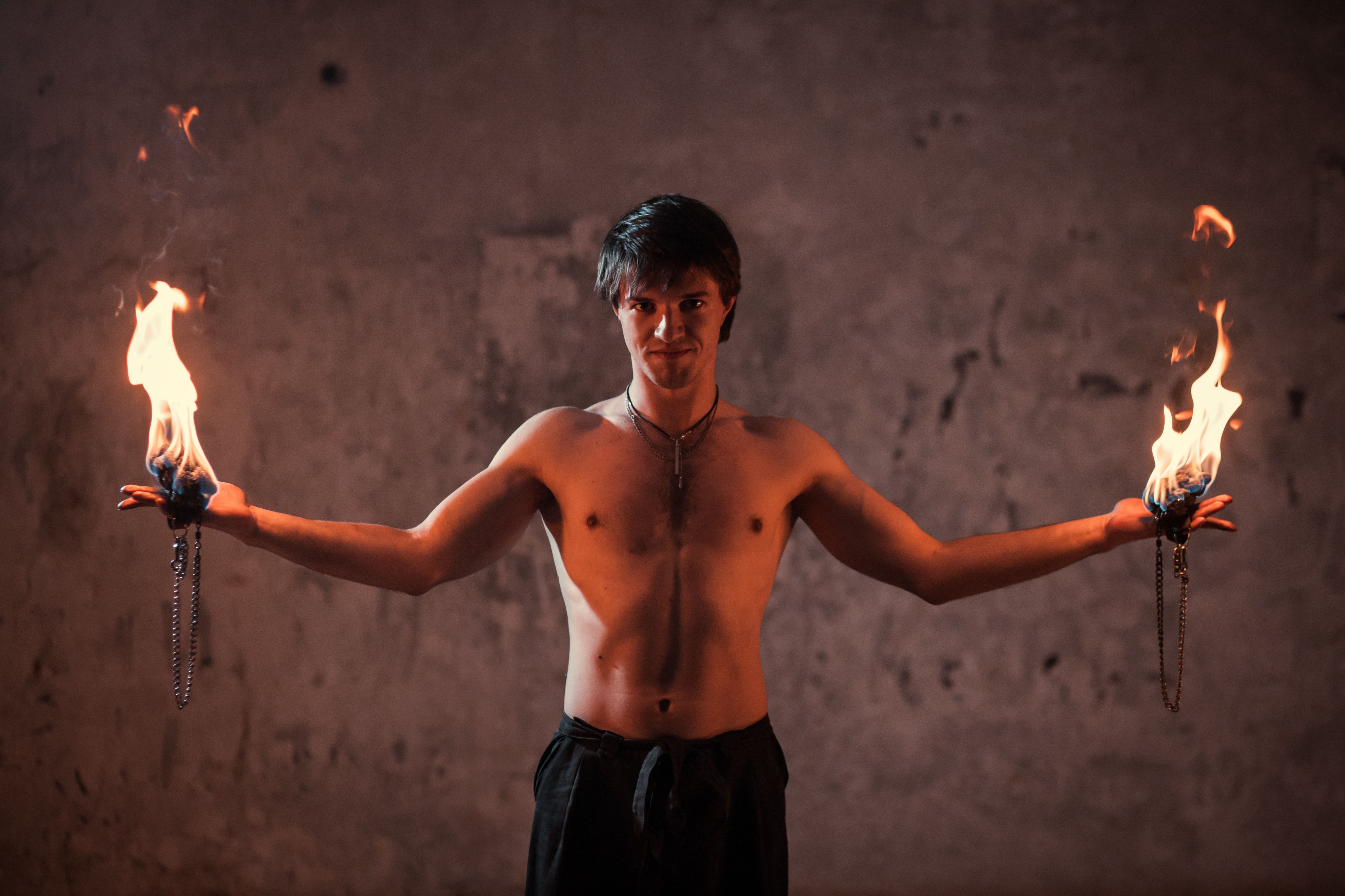 Shirtless Man Fire Dancing · Free Stock Photo