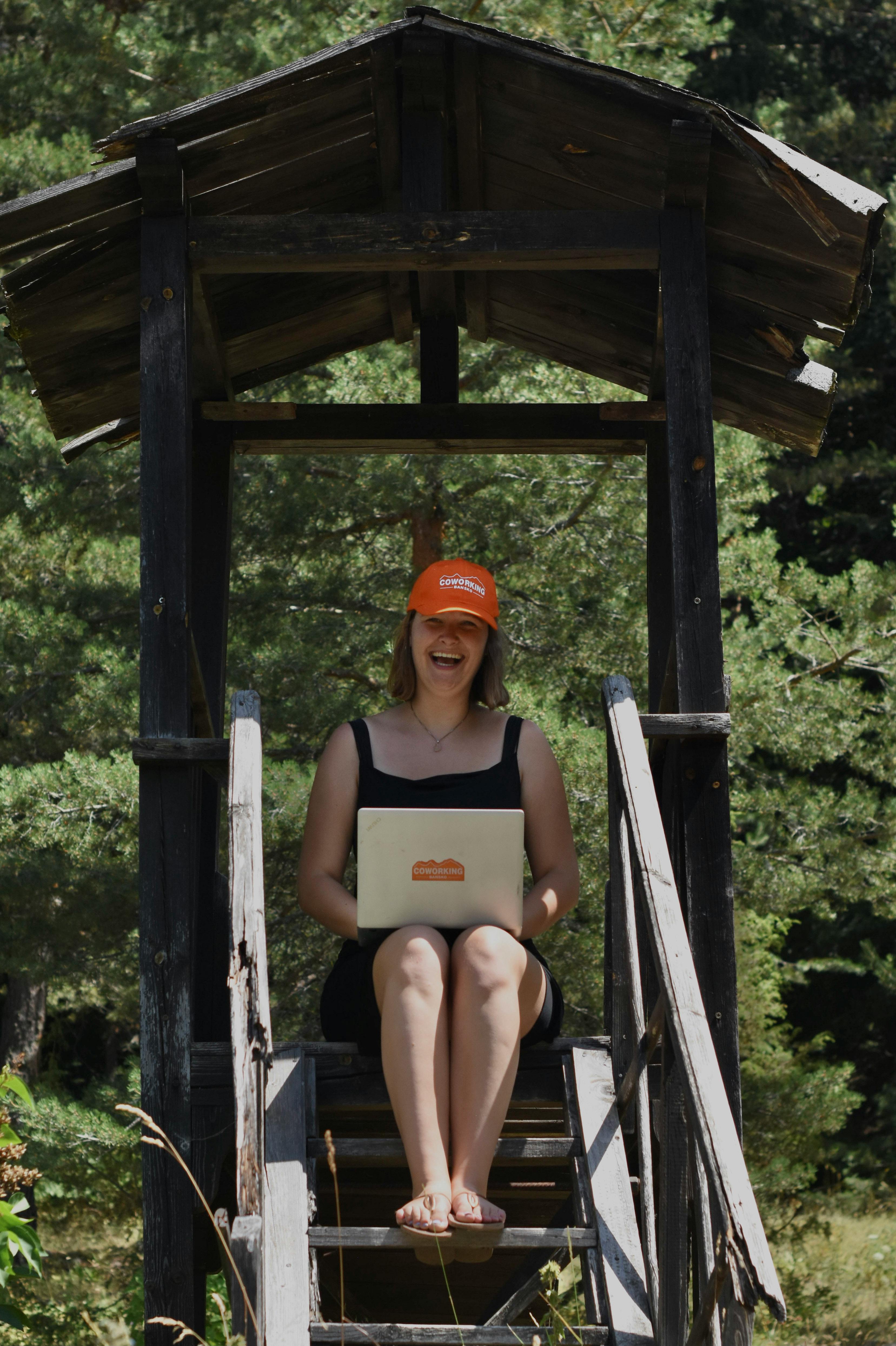 Woman Sitting on the Lifeguard Tower · Free Stock Photo
